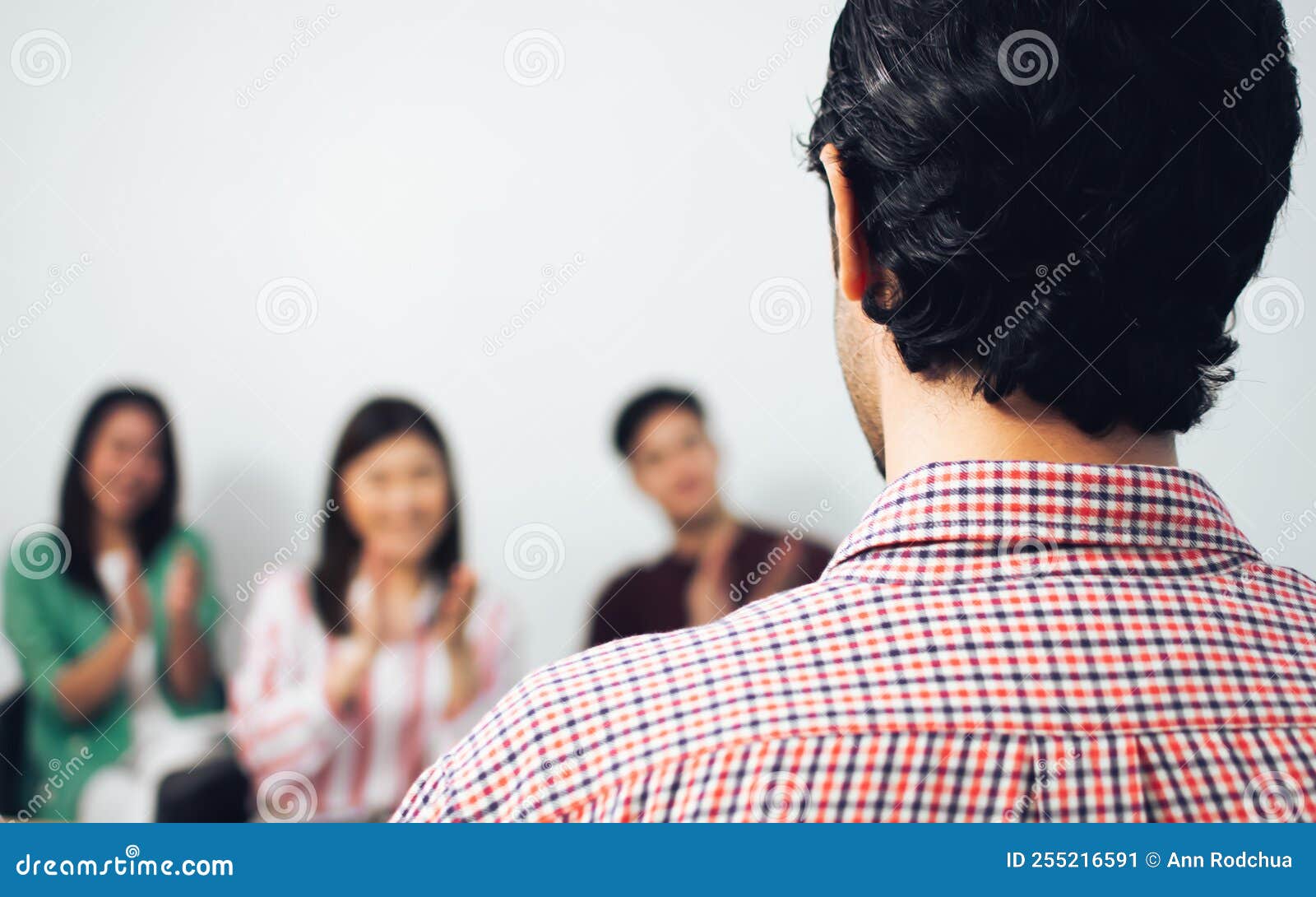 Focus of Man S Back while Teaching, Training or Coaching People in a ...