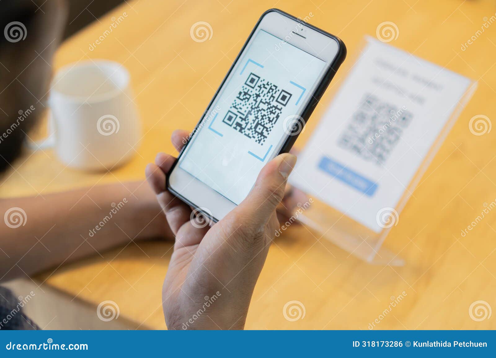 Selective Focus of Man S Hand Scanning QR Code through Mobile Phone at ...