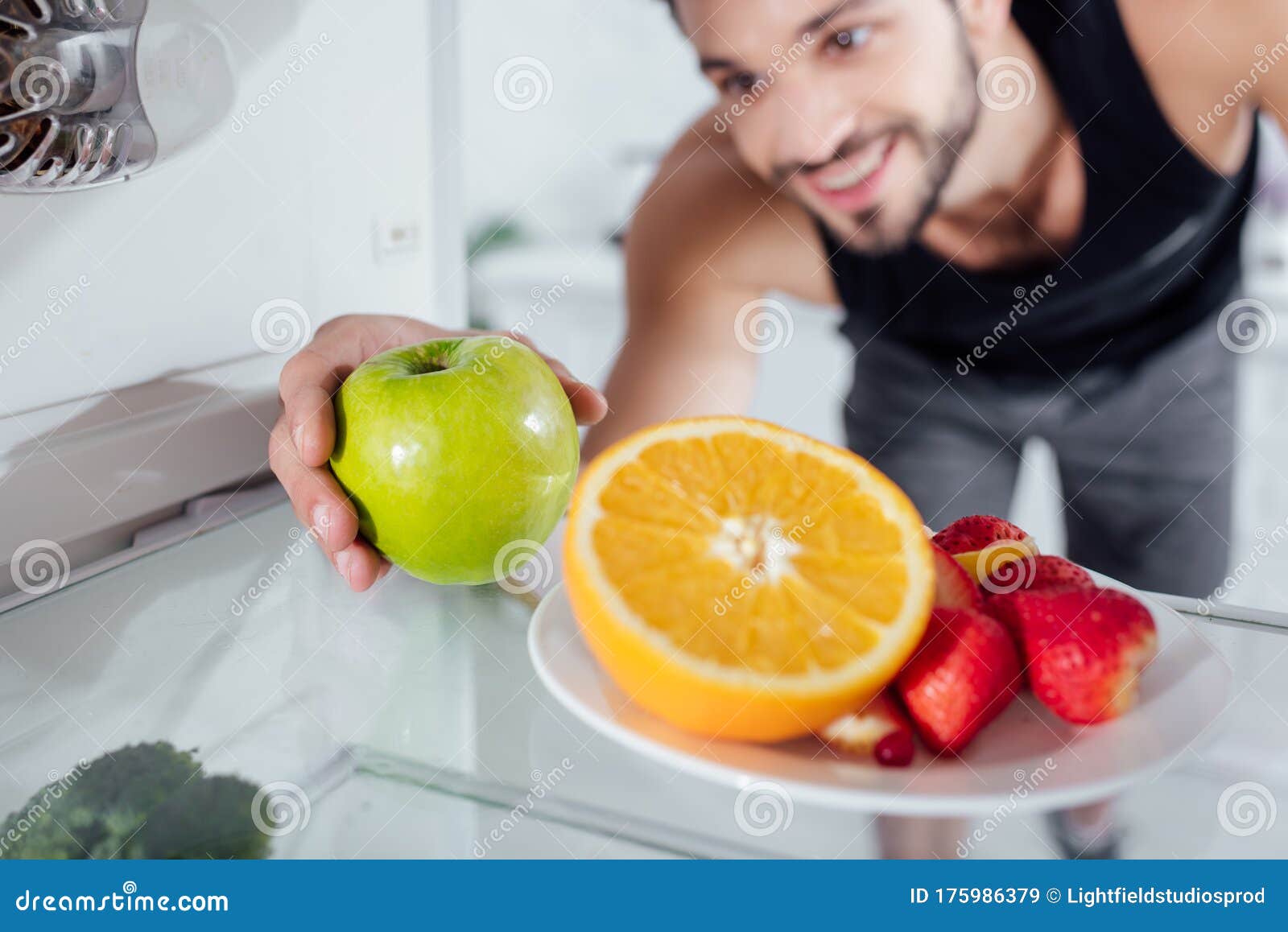 Selective Focus of Man Taking Apple Stock Image - Image of bearded ...