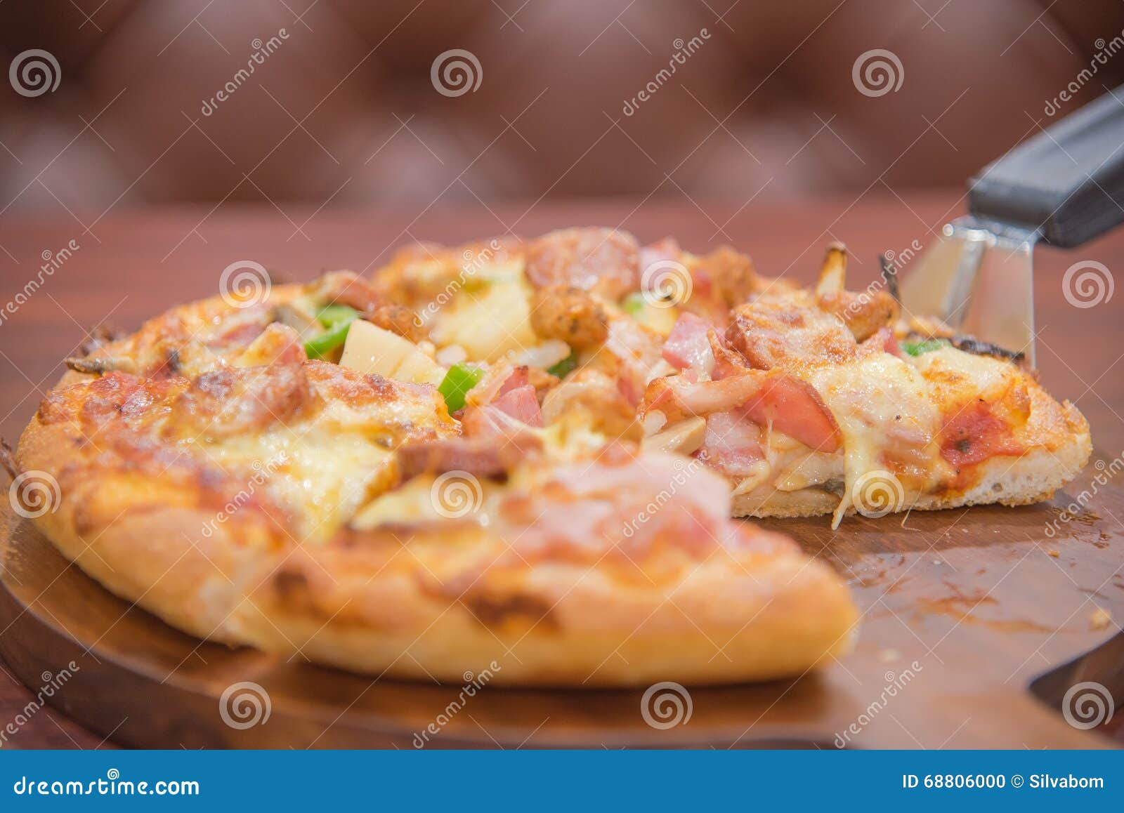 Selective Focus on Meat Deluxe Pizza Slice on Pizza Scoop Stock Photo ...