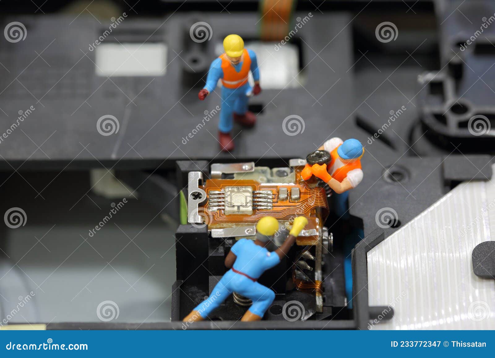 Selective Focus of Miniature Engineer and Worker Fixed To Remove for ...