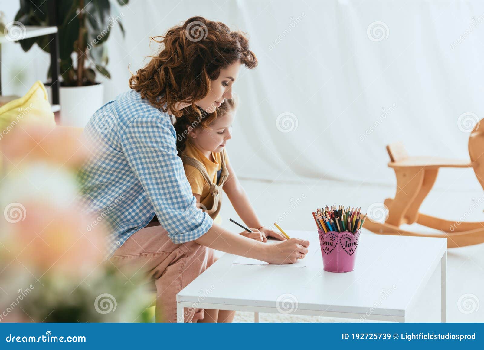 Focus of Nanny and Child Drawing Stock Image - Image of parent, home ...