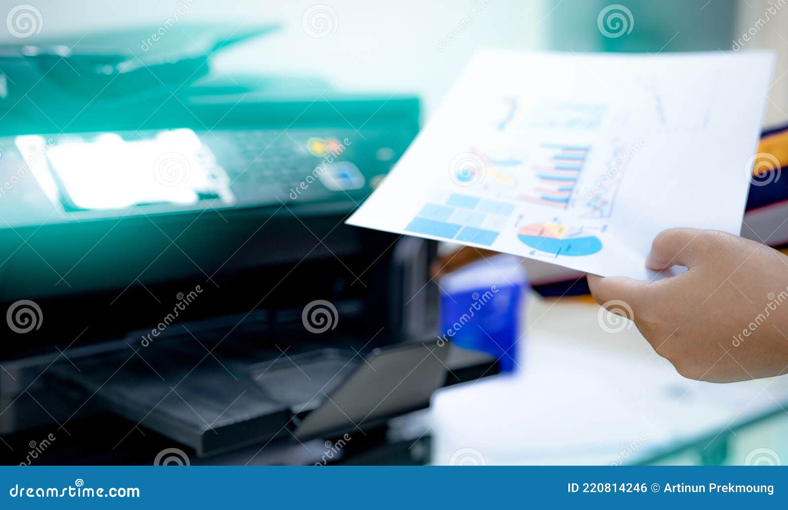 Selective Focus on Office Worker Hand Holding Paper. Multifunction ...