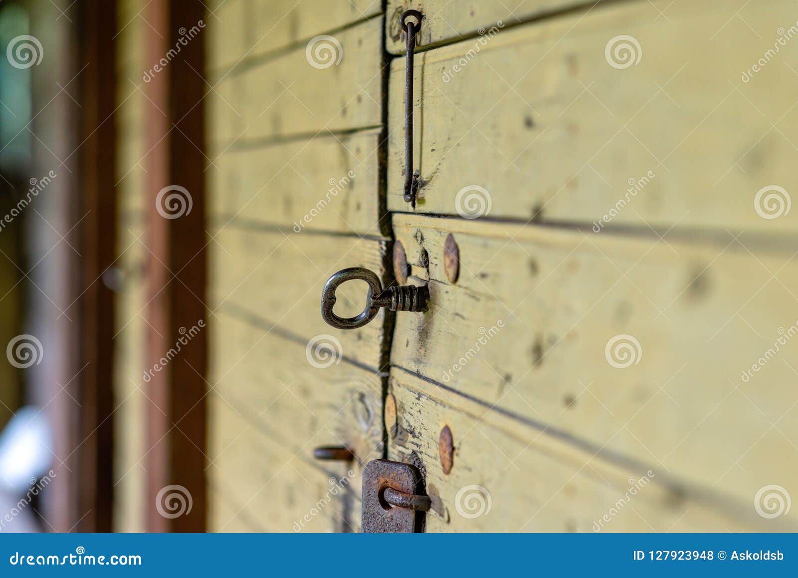 Selective Focus. an Old Barn with Wooden Doors and a Key. Stock Photo ...