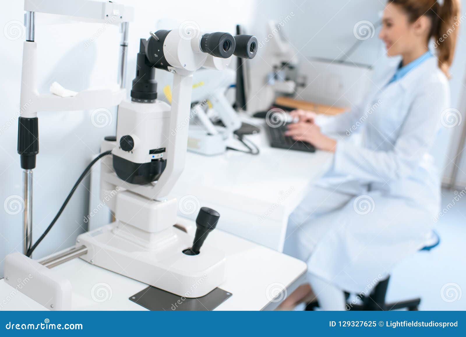 Selective Focus of Optometrist Working with Computer in Clinic Visual ...