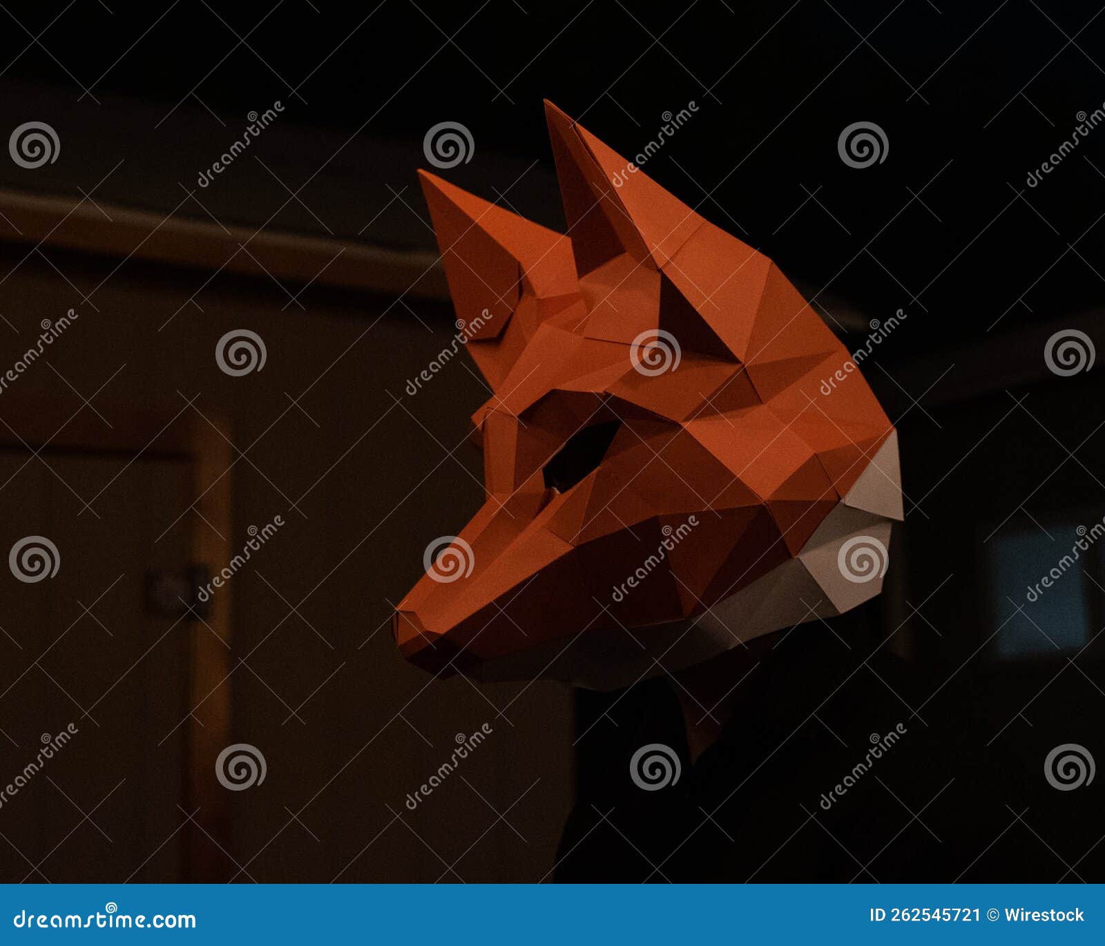 Selective Focus of a Person Wearing a Low Poly Fox Mask Stock Image ...