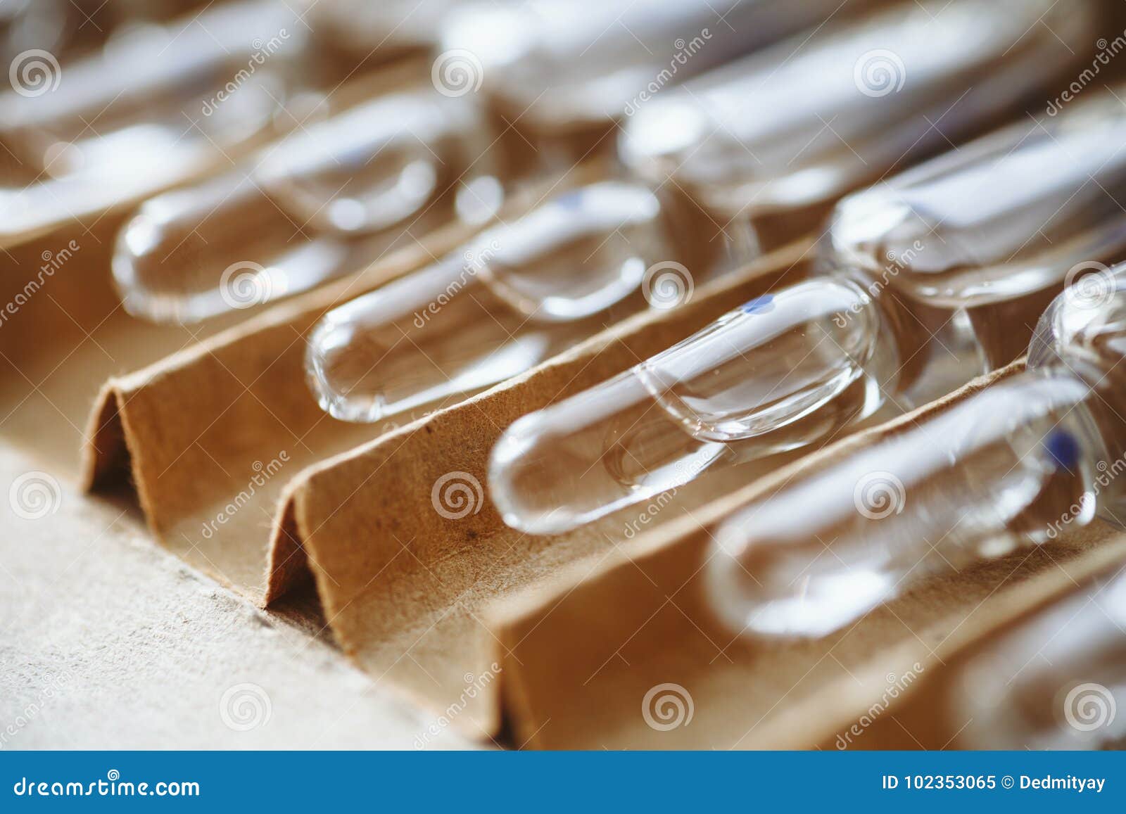 Selective Focus with Perspective View of Many Glass Ampoules or Vials ...