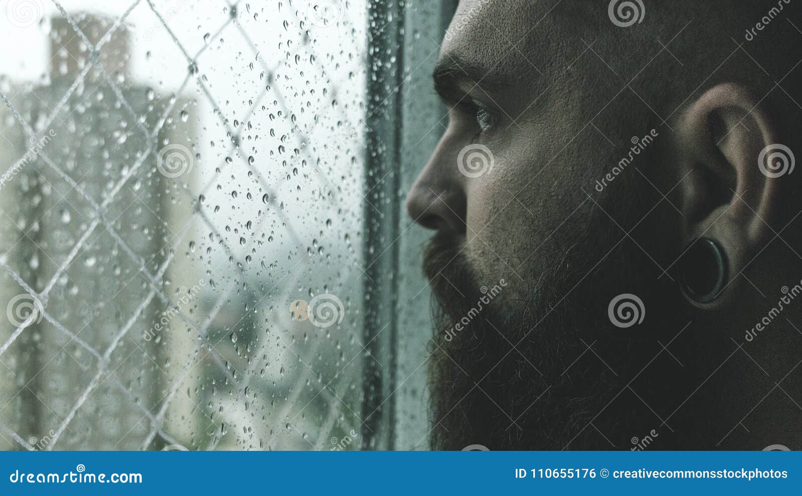 Selective Focus Photography Of Man Staring On Glass Window Filled With ...