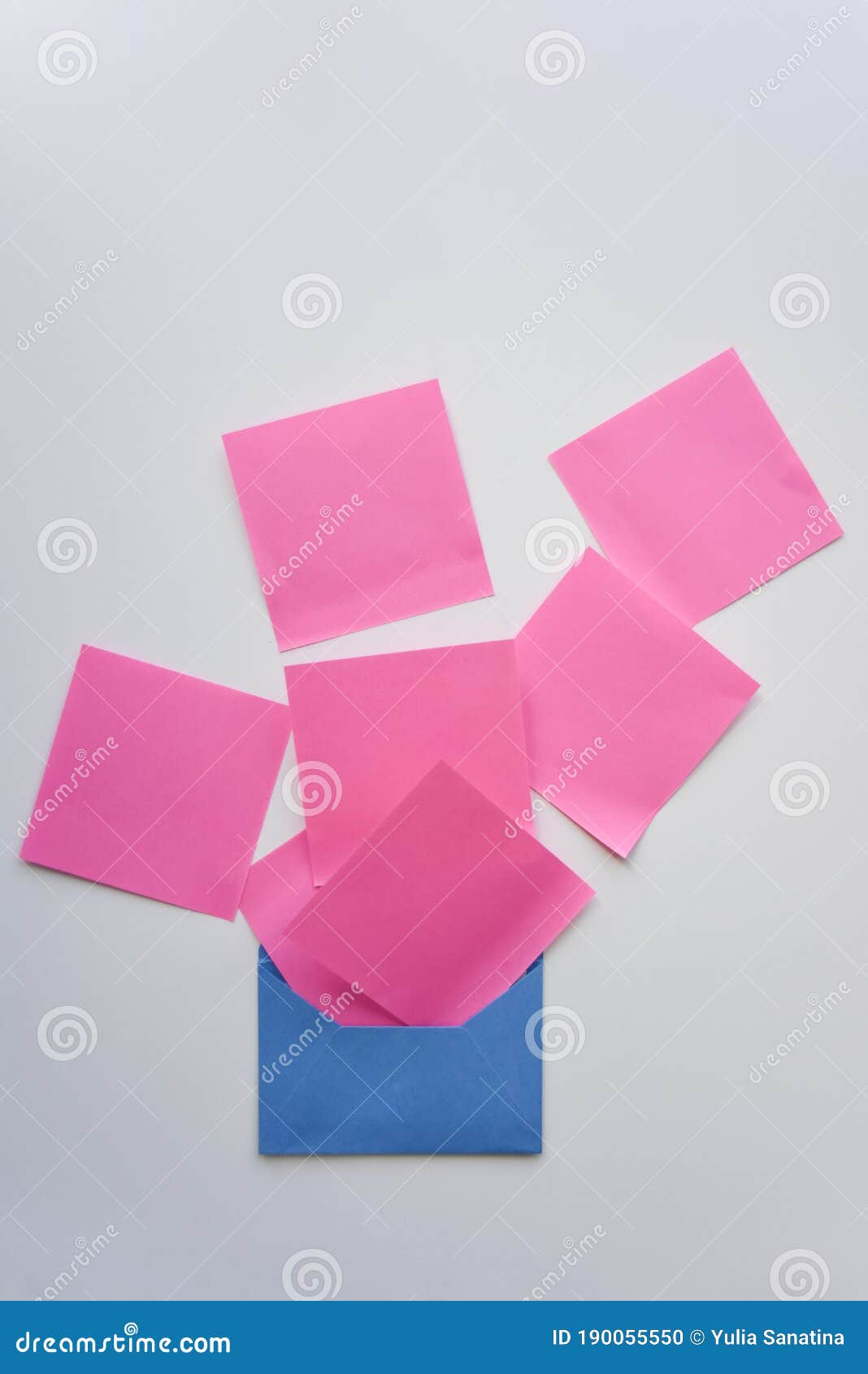 Selective Focus, Pink Paper Stickers in Chaos and Blue Envelope on the ...