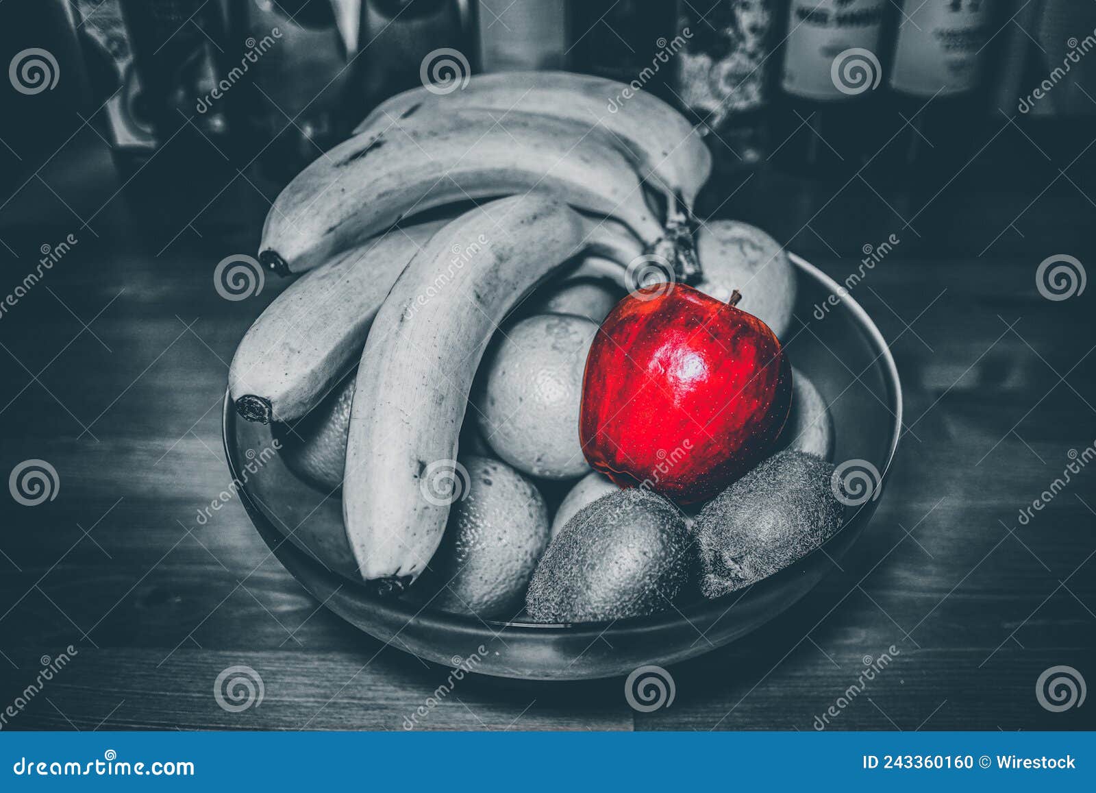Selective Focus of a Red Apple with Grayscale Fruits in a Bowl Stock ...