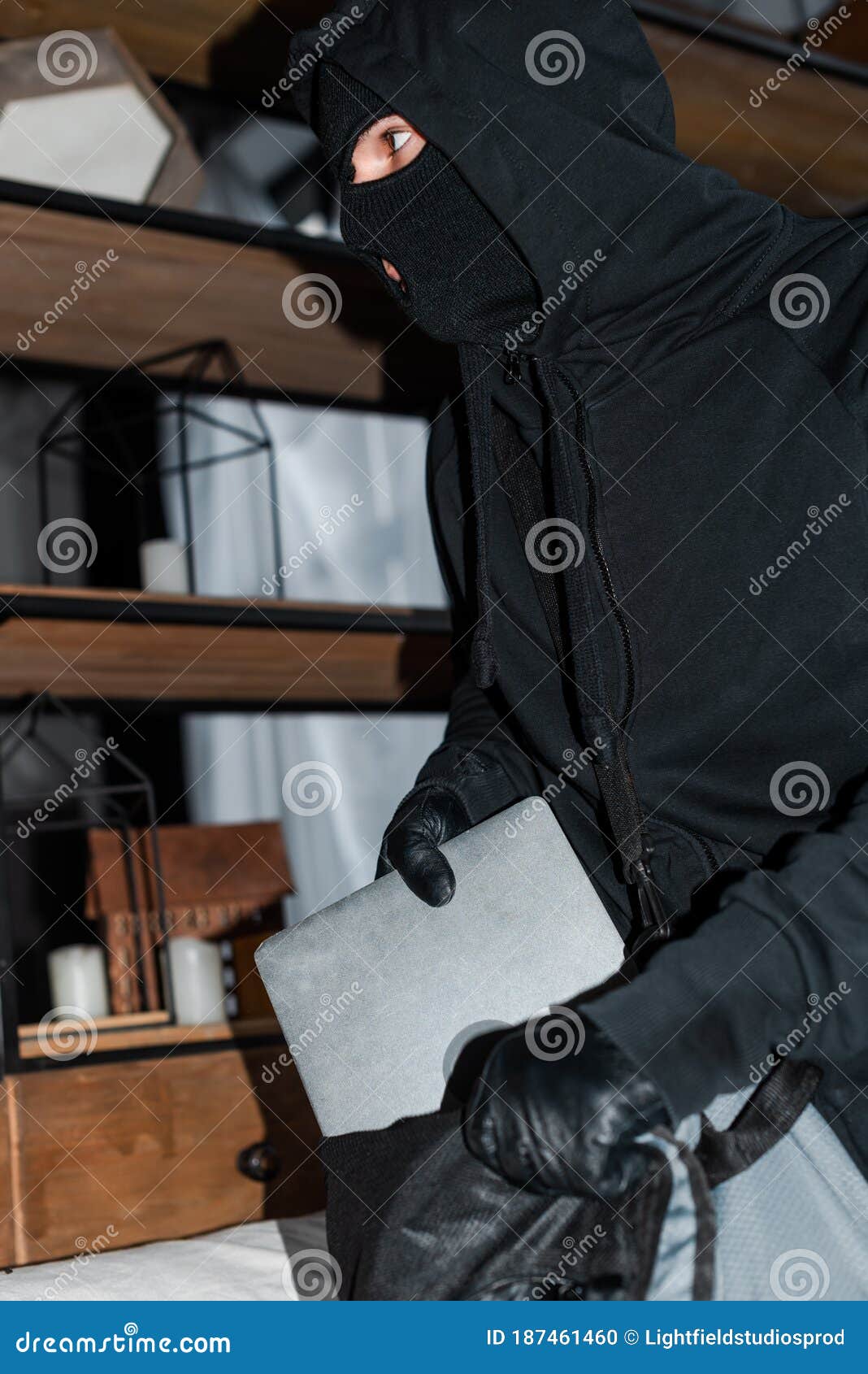 Focus of Robber in Mask and Stock Photo - Image of mask, indoors: 187461460