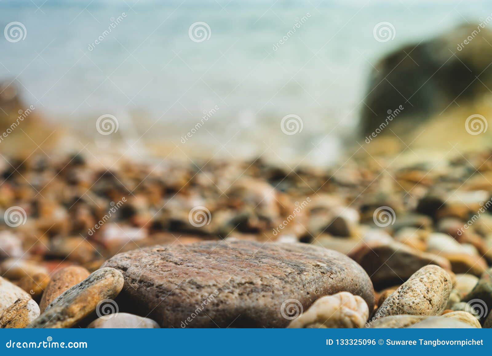 Selective Focus on Rocks Texture with Blur Beach. Stock Photo - Image ...