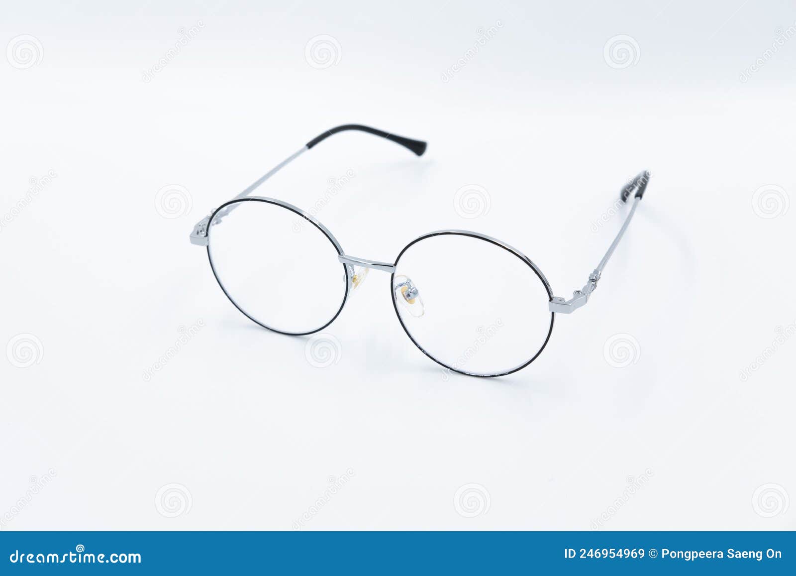 Selective Focus Round Eyeglasses with Silver Rim. Front Left View ...