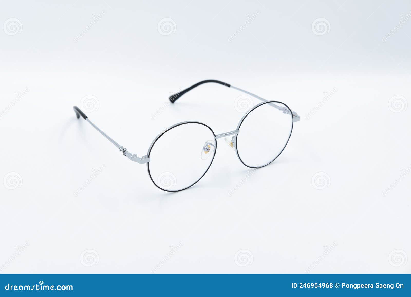 Selective Focus Round Eyeglasses with Silver Rim. Front Right View ...