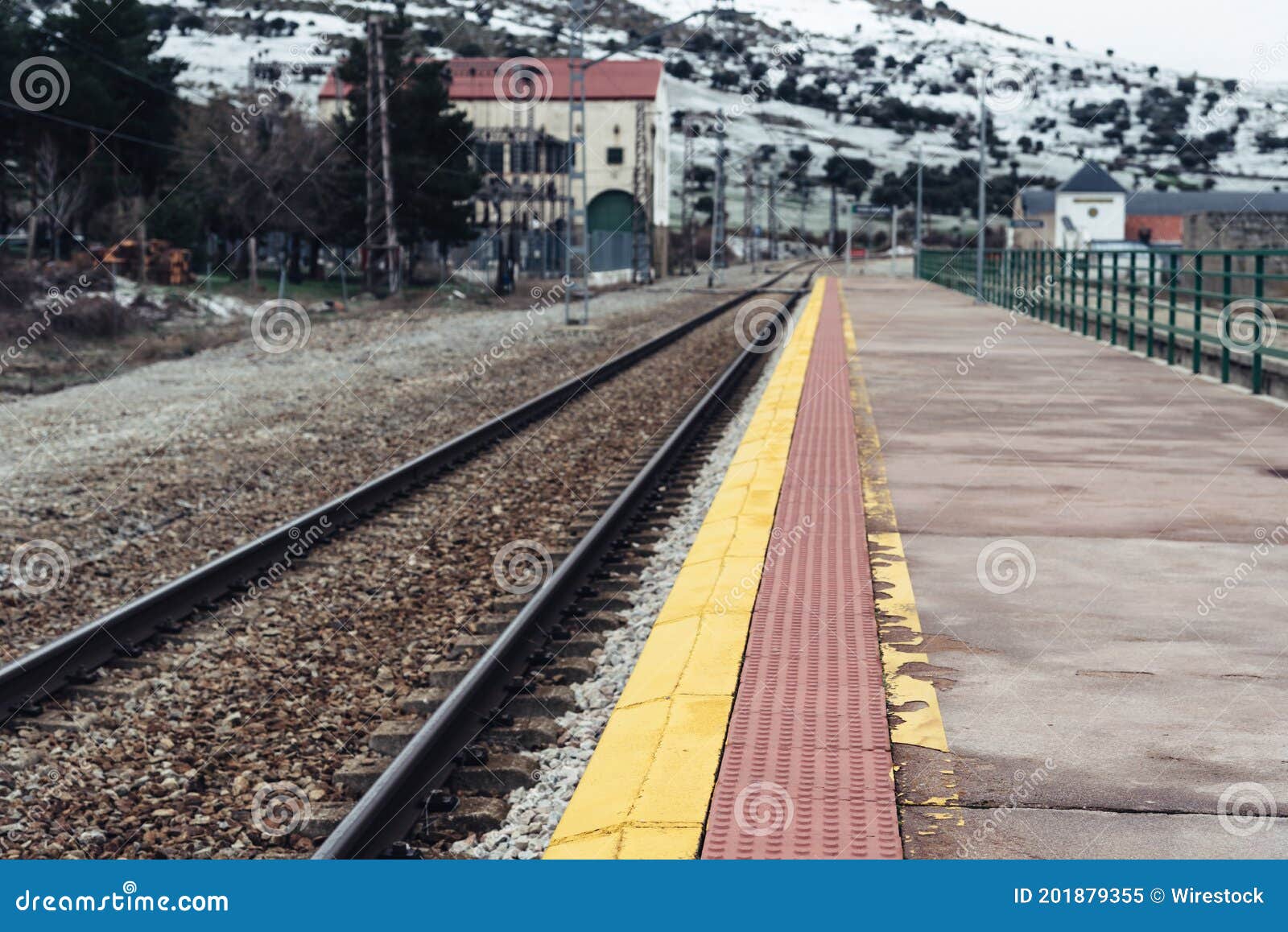 Selective Focus Shot of an Empty Train Track in a Railway Station in ...
