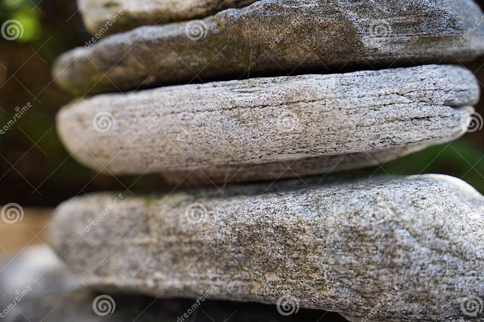 Selective Focus Shot of Flat Wide Rocks Stack Together Creating a Tower ...