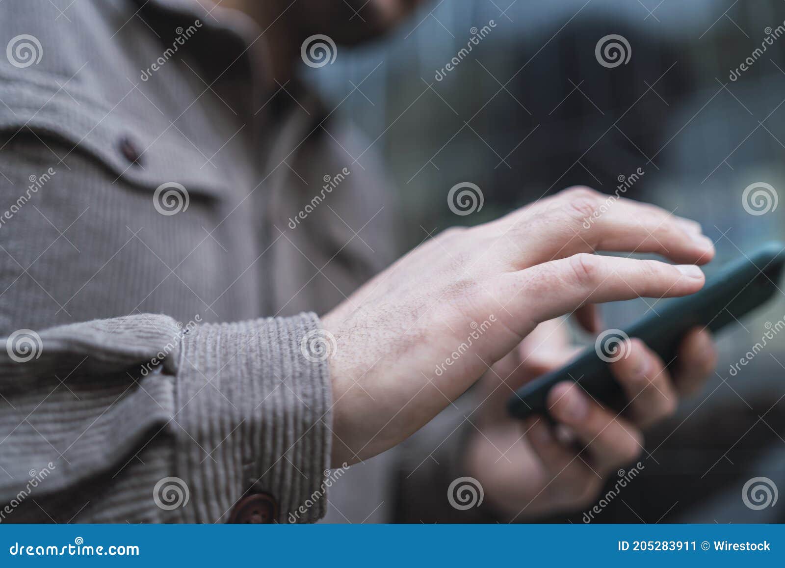 Selective Focus Shot of a Male Hand Scrolling on the Phone Stock Image ...