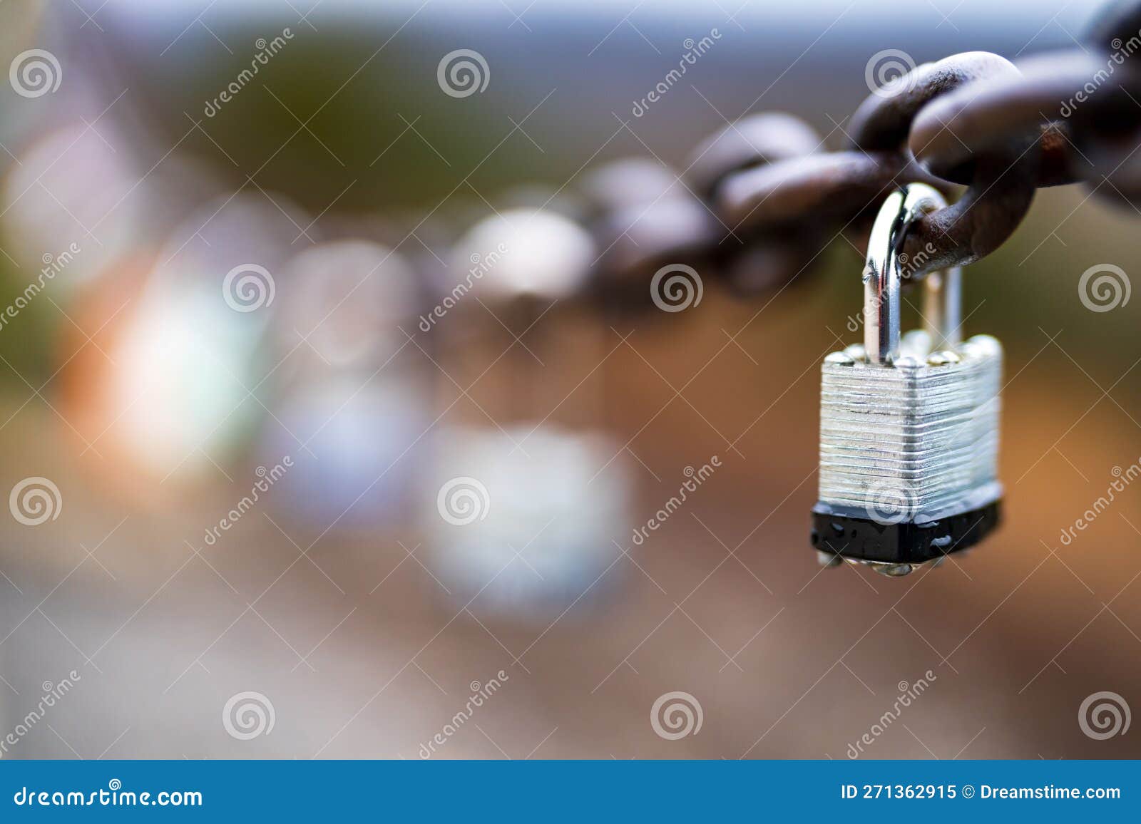 Selective Focus Shot of an Old Rusty Chain with a Padlock Secured To it ...