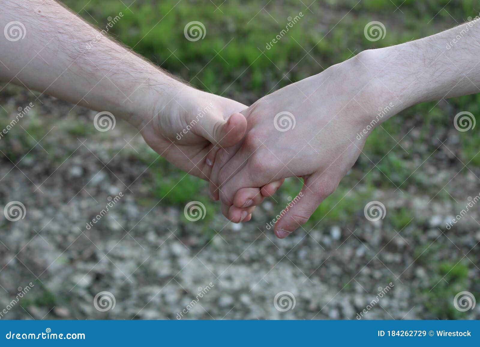 Selective Focus Shot of a Pair of Hands Holding Each Other - Concept ...