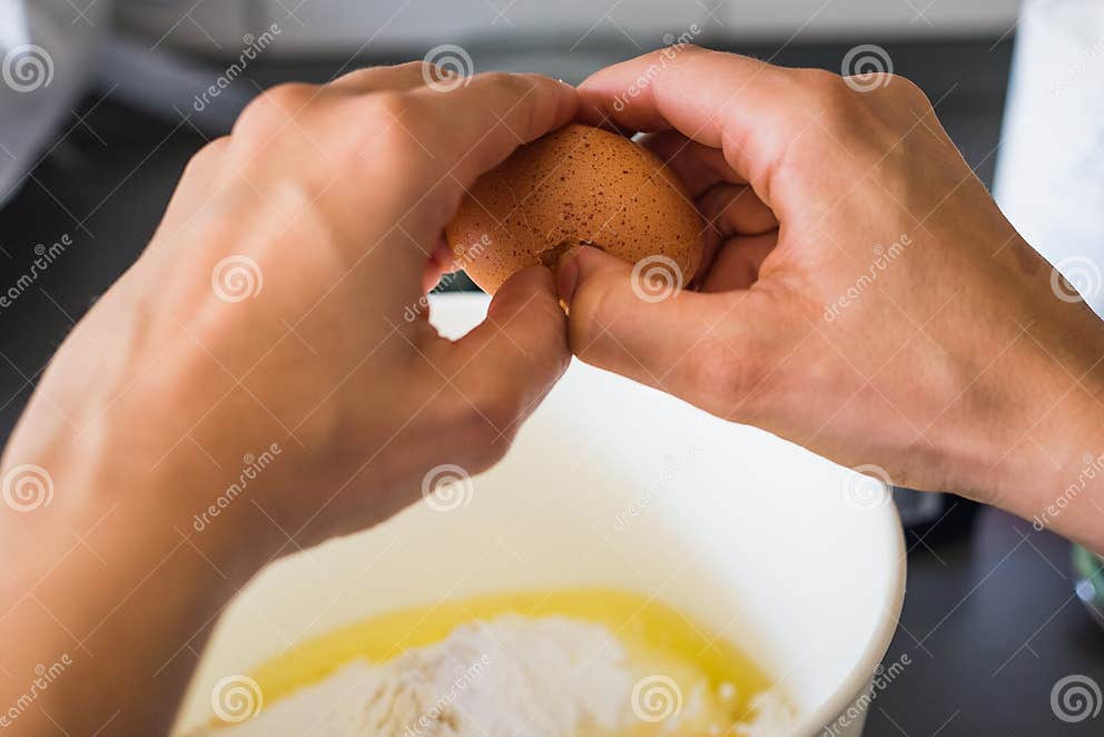 Selective Focus Shot of a Person Cracking an Egg Stock Image - Image of ...