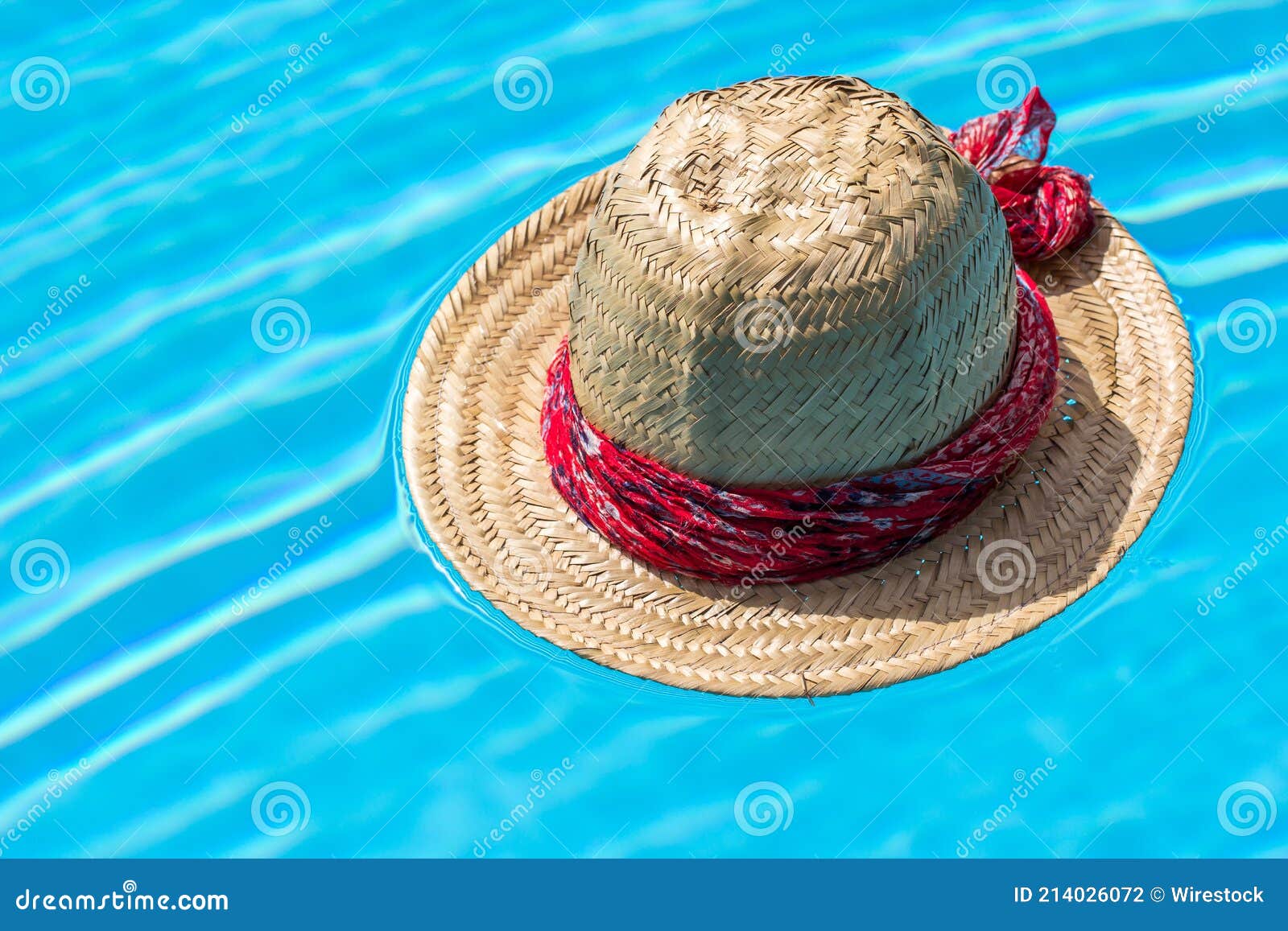 Selective Focus Shot of a Straw Hat Floating on the Water Stock Photo ...