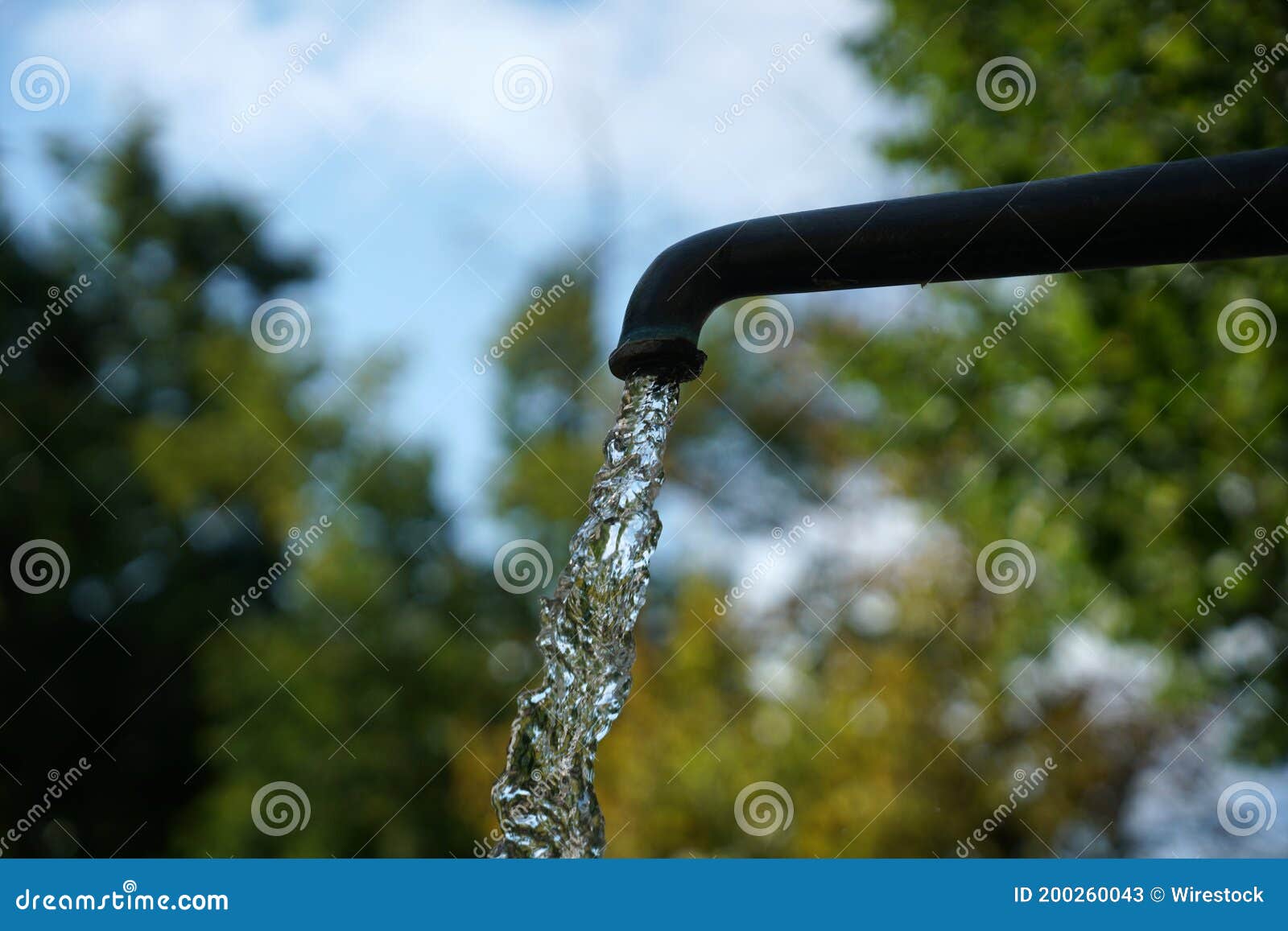 Selective Focus Shot of Water Pouring Out of a Pipe Stock Image - Image ...