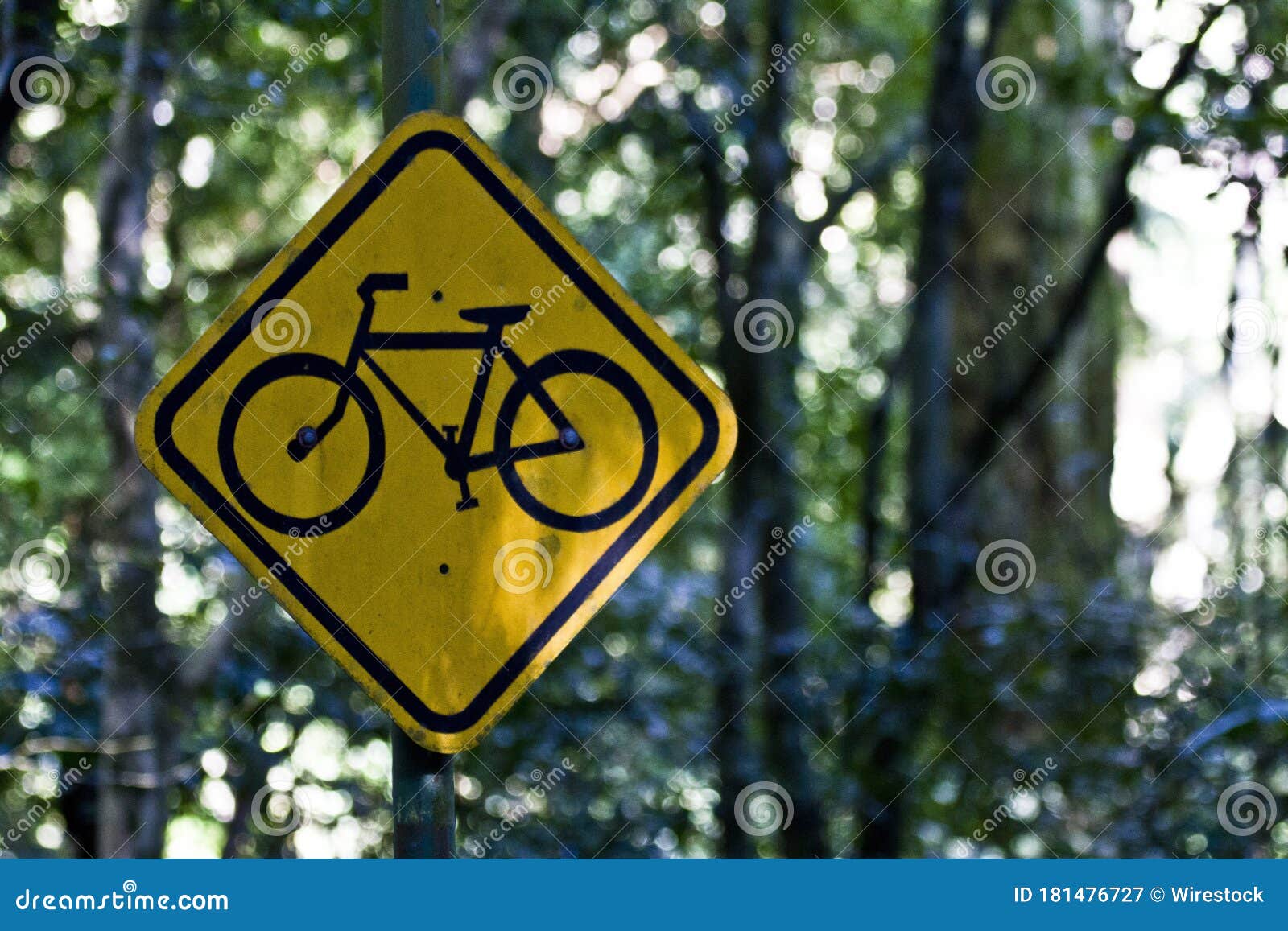 Selective Focus Shot of a Yellow Warning Signpost Stock Image - Image ...