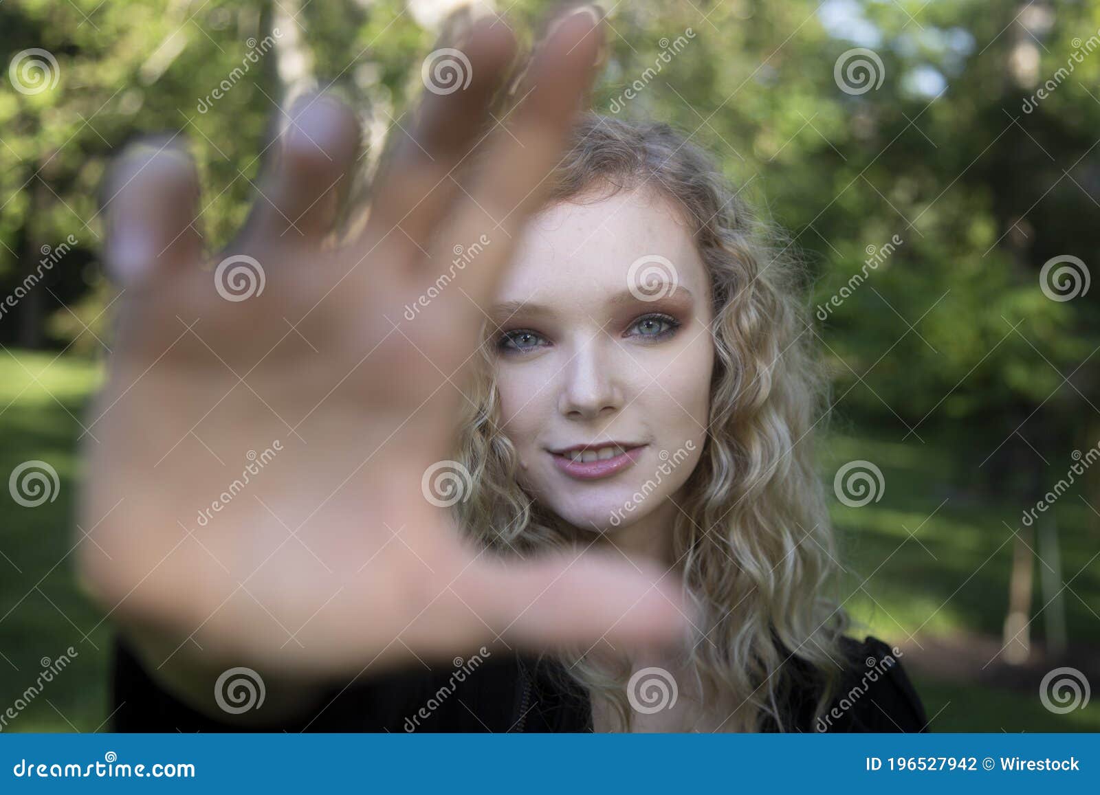 Selective Focus Shot Of A Young Attractive Female Posing At Camera