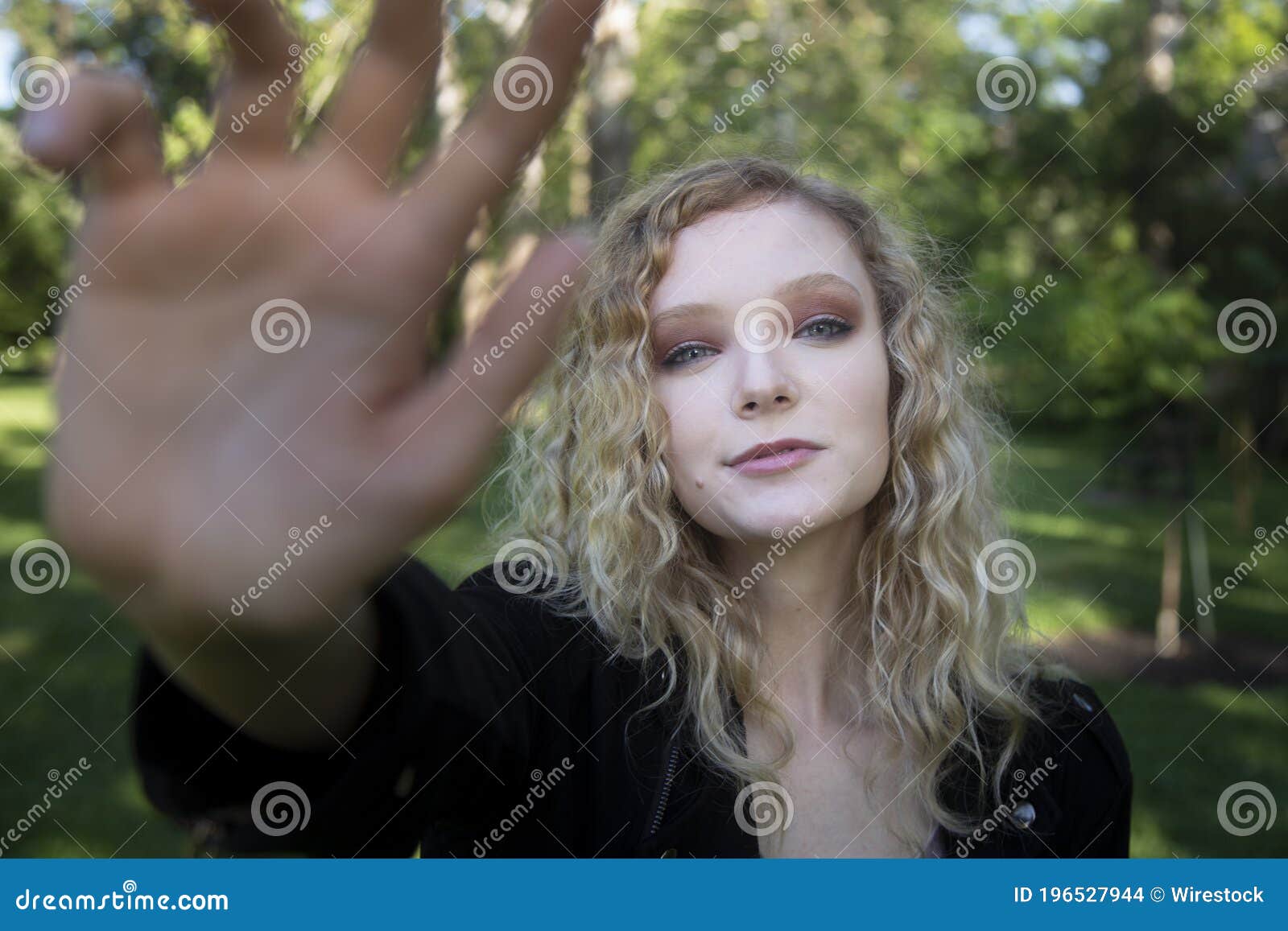 Selective Focus Shot Of A Young Attractive Female Posing At Camera
