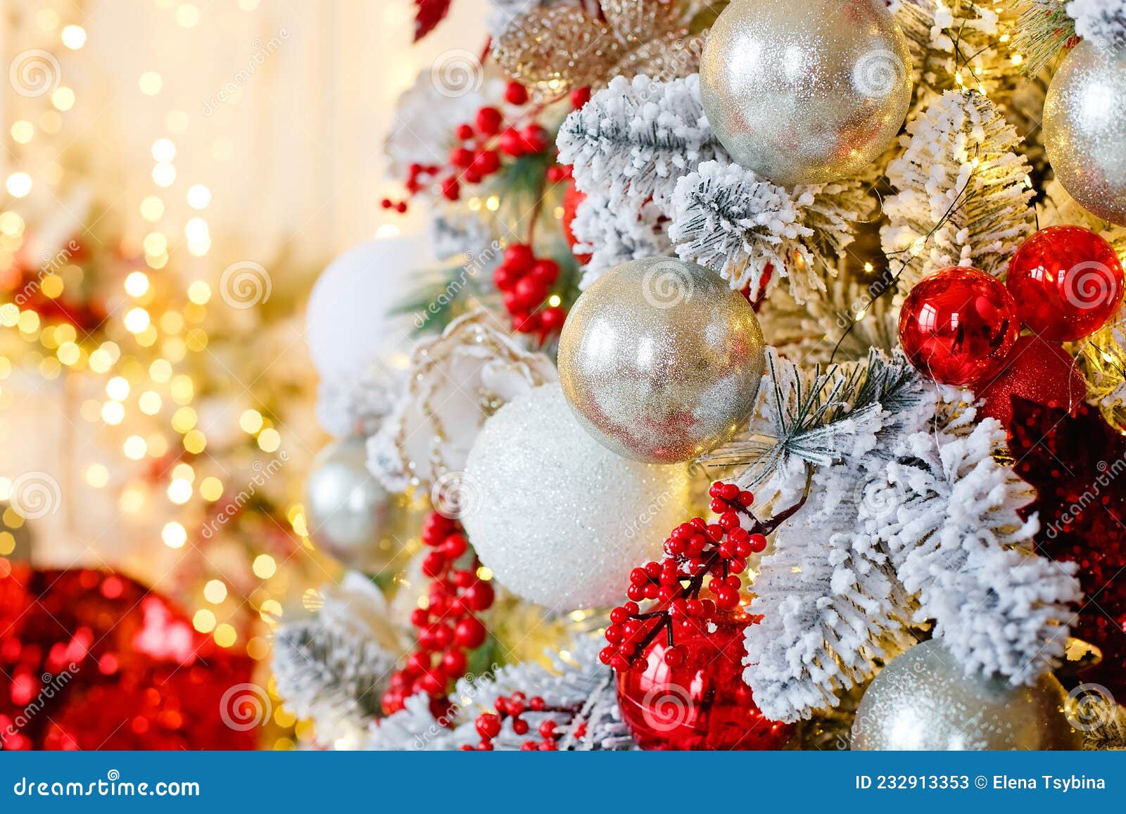 Selective Focus. a Side Shot of a Pine Tree Decorated with Red and ...