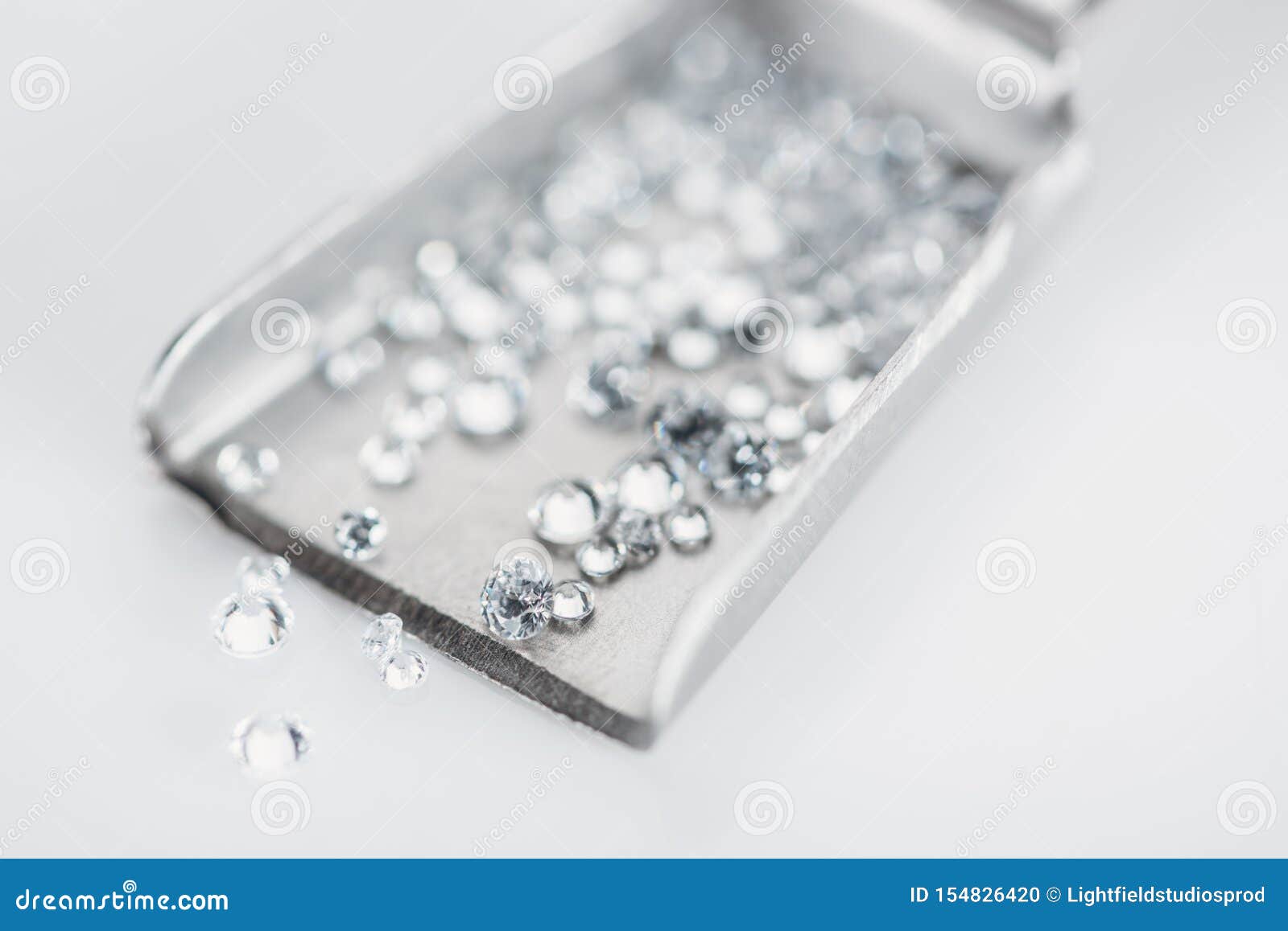 Selective Focus of Small Diamonds on Spatula Isolated Stock Photo ...