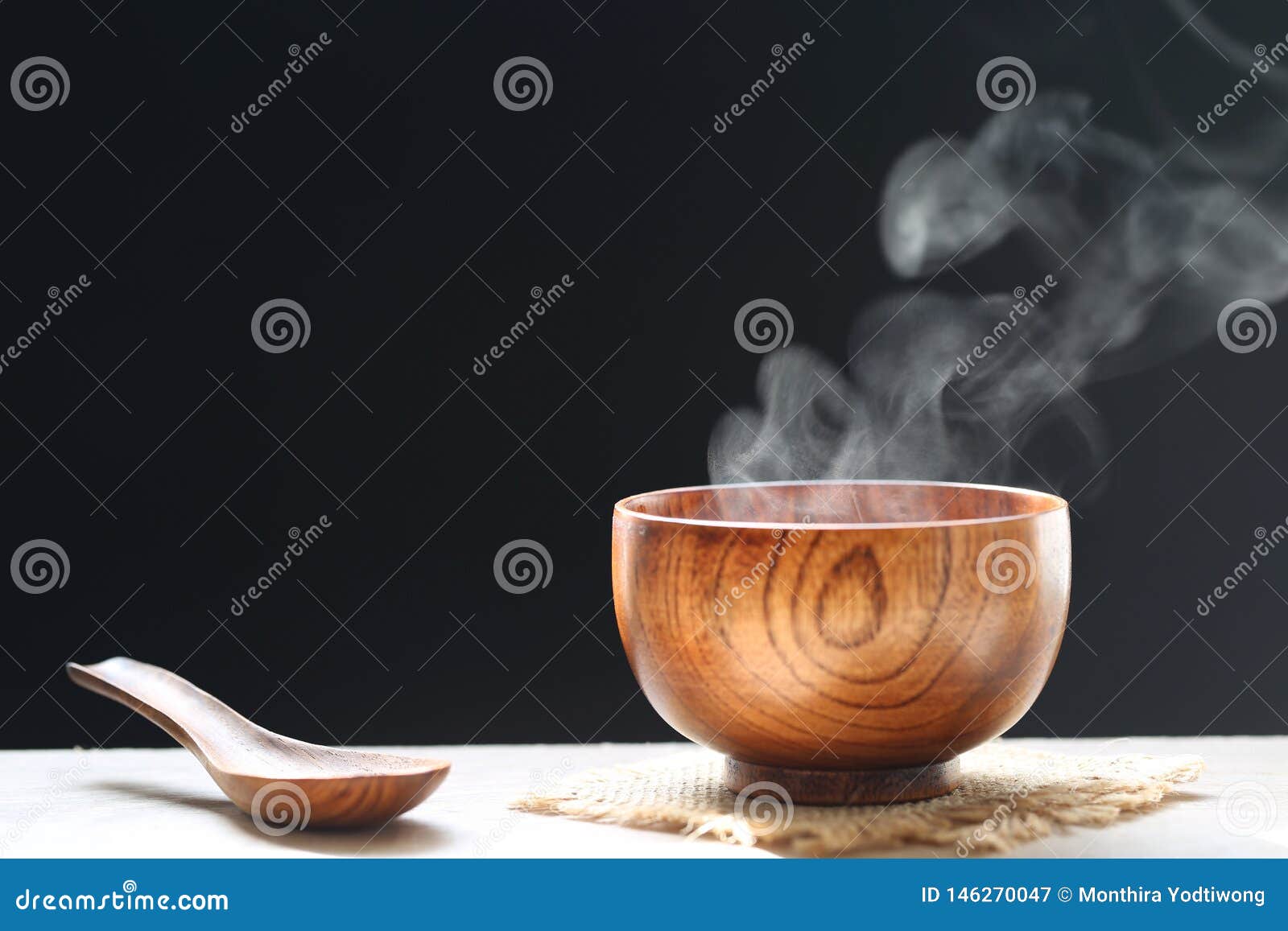 Selective Focus of Smoke Rising with Hot Soup in Cup on Dark ...