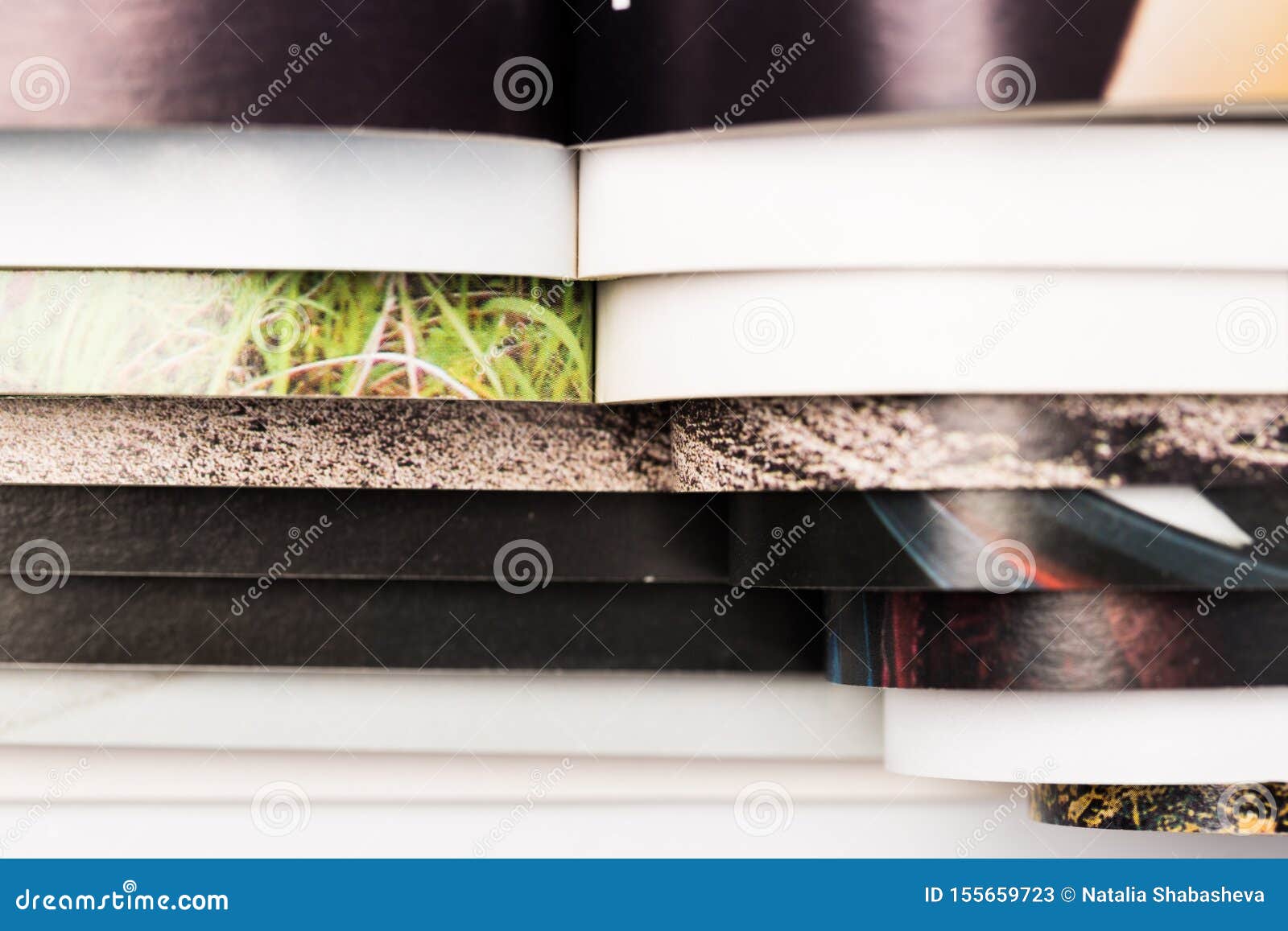 Selective Focus of the Stacking Magazine Place on White Background ...