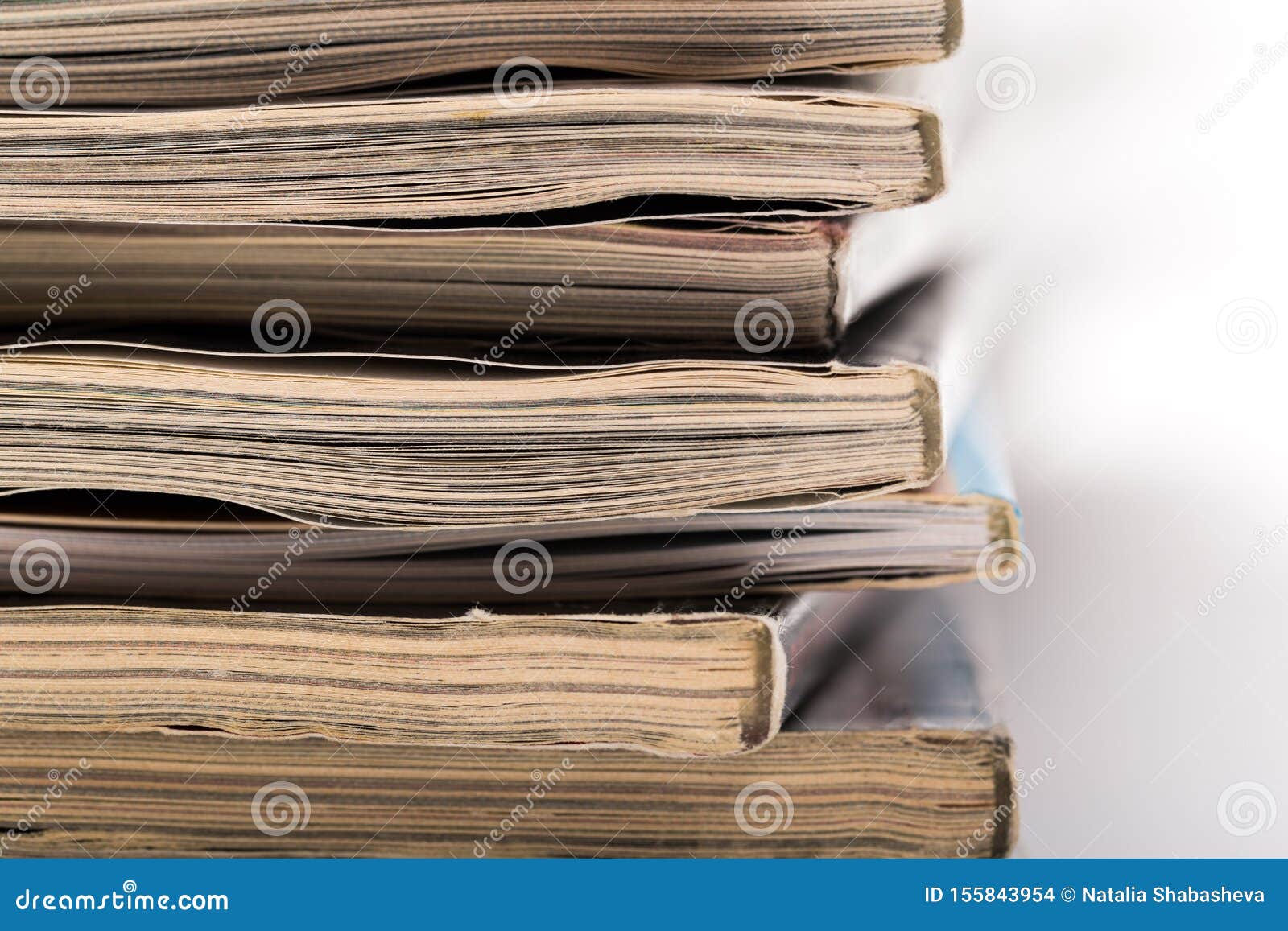Selective Focus of the Stacking Magazine Place on White Background ...