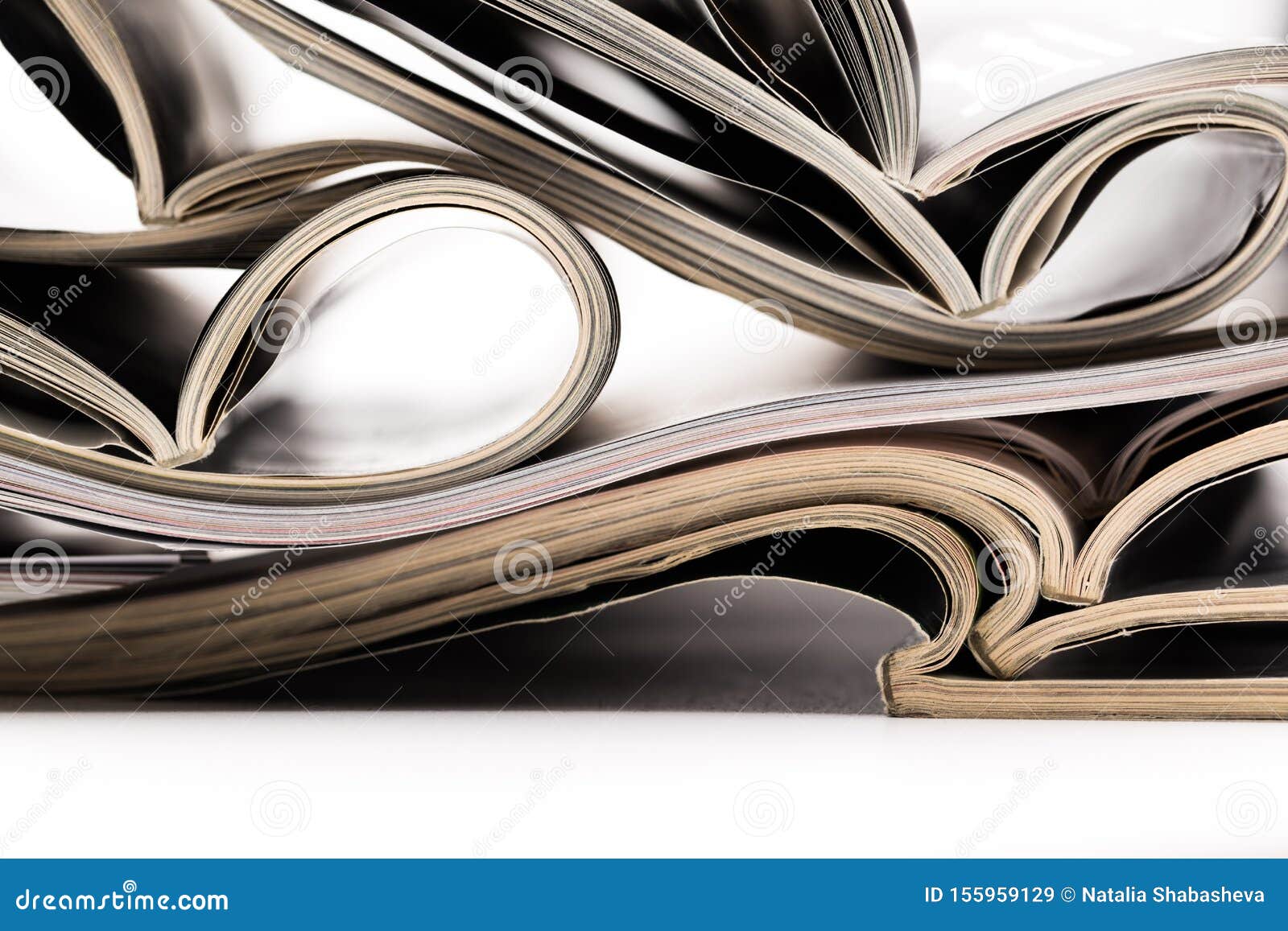 Selective Focus of the Stacking Magazine Place on White Background ...