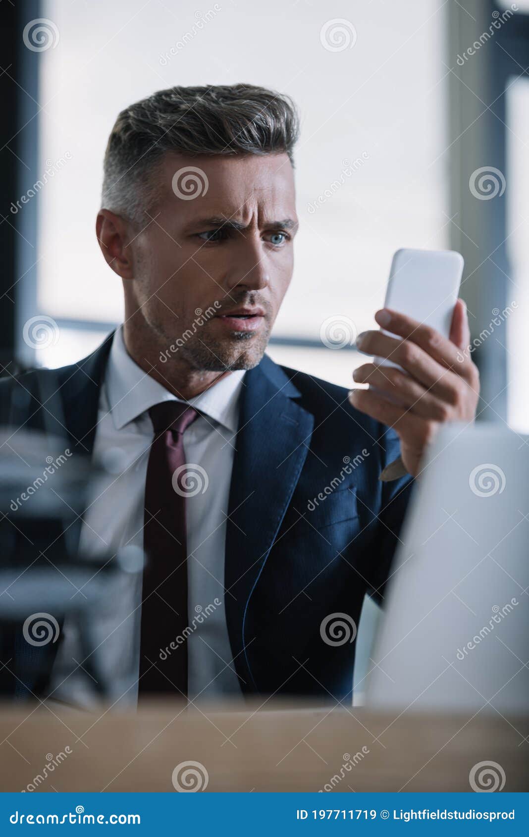 Selectve Focus of Surprised Man Holding Smartphone Stock Image - Image ...