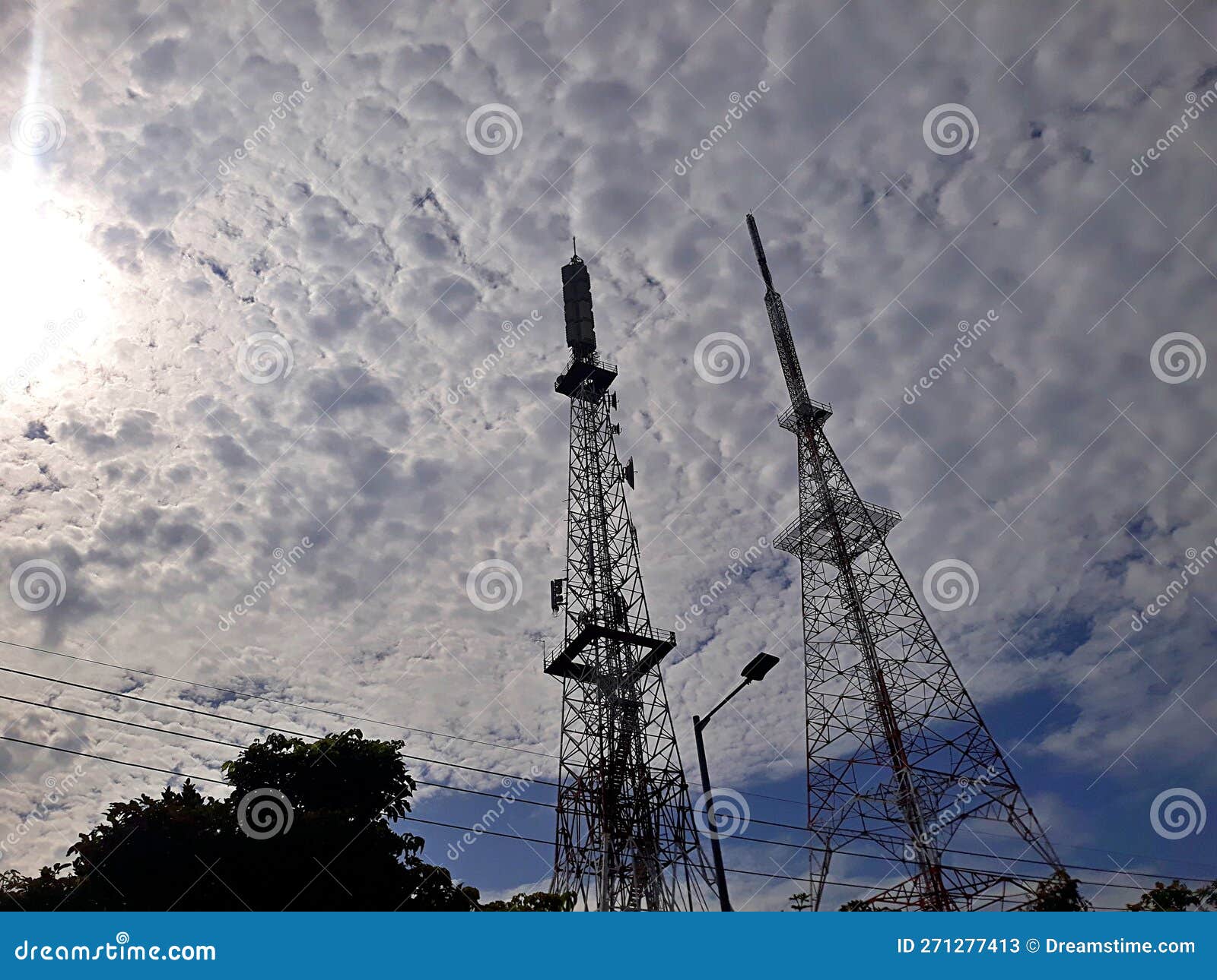 Television Station Receiver and Transmitter Tower with a Background of ...