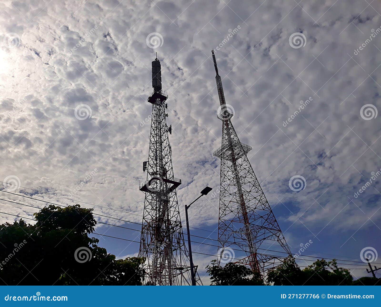 Television Station Receiver and Transmitter Tower with a Background of ...