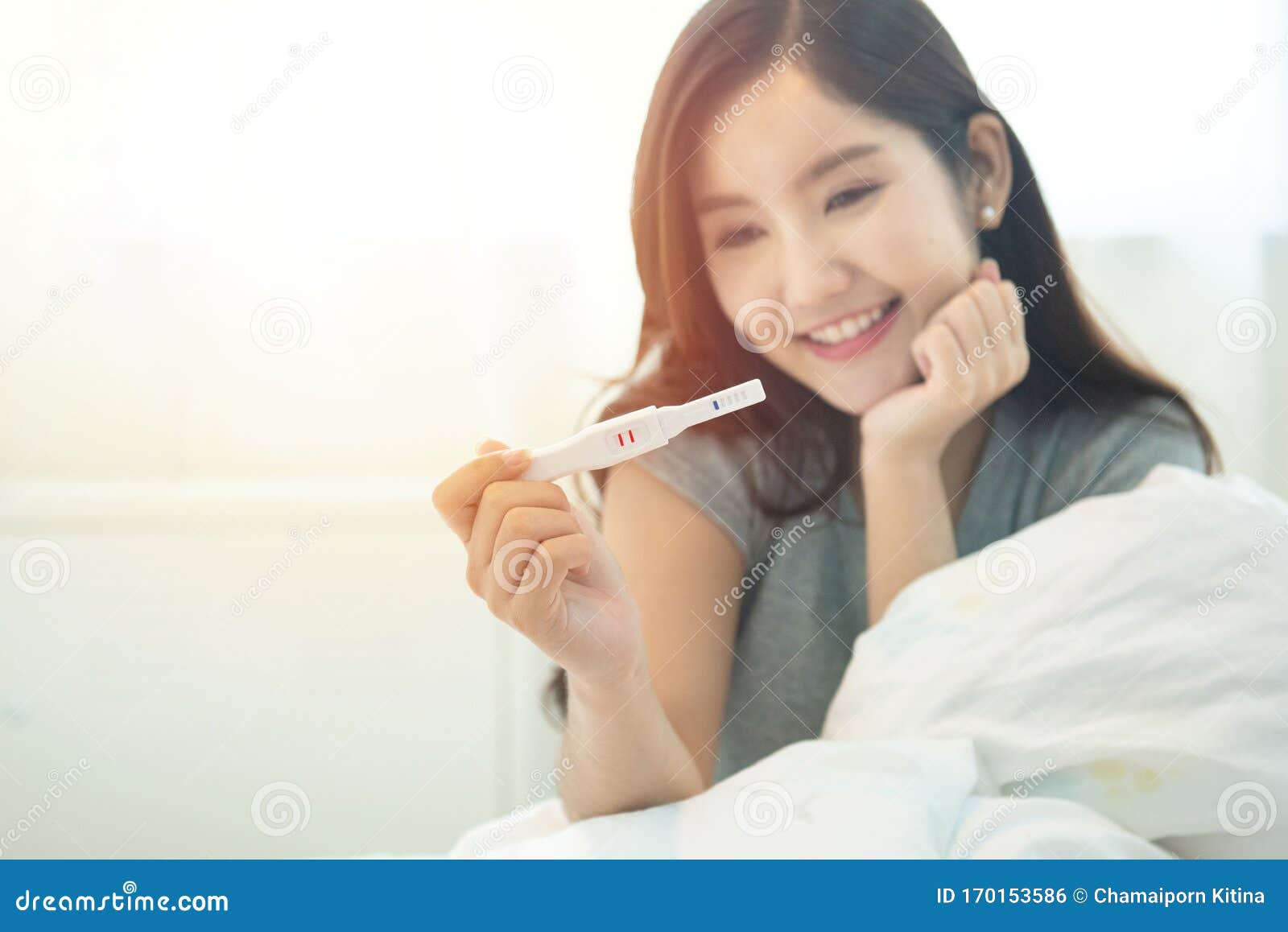 Selective Focus on Tester.Expecting Mom with Cheerful Face with ...