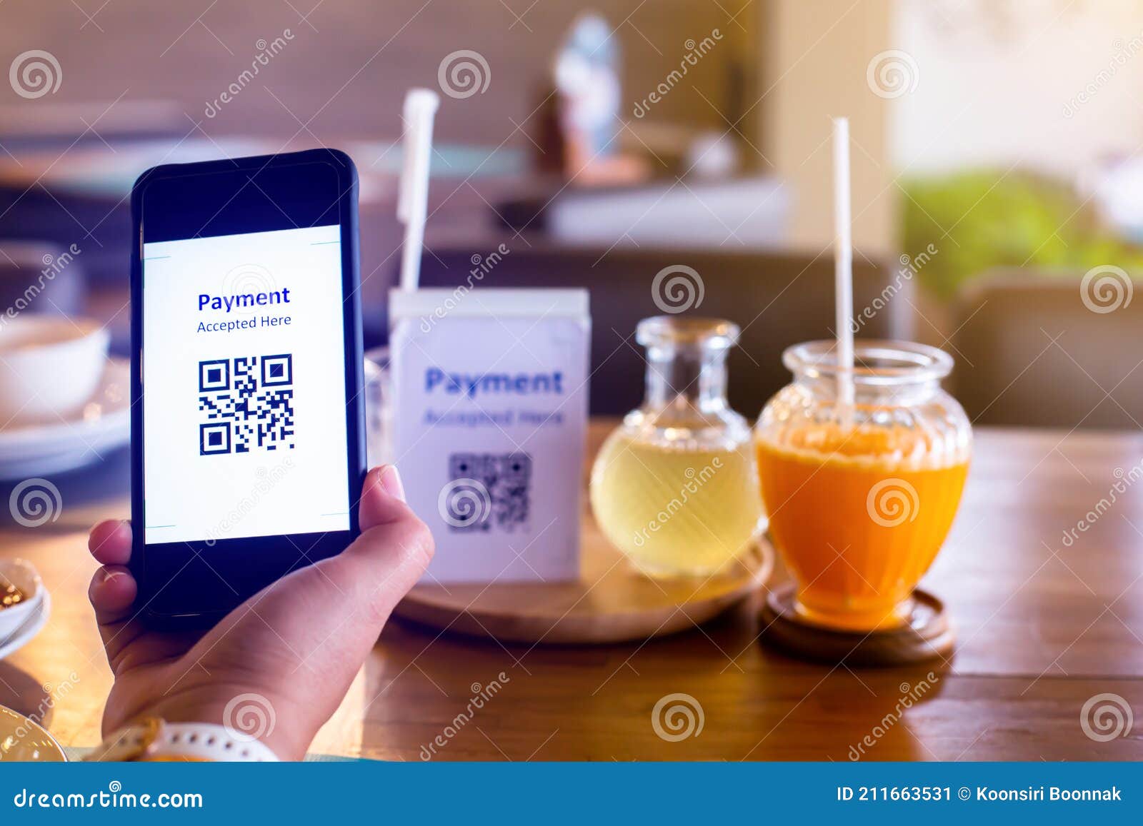 Selective Focus To Hand Using Smart Phone To Scan QR Code on Tag with ...