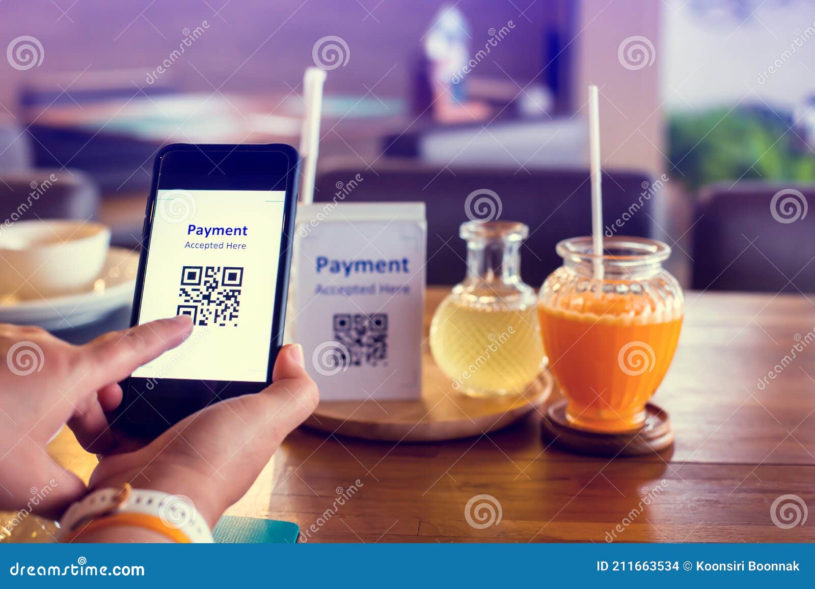 Selective Focus To Hand Using Smart Phone To Scan QR Code on Tag with ...