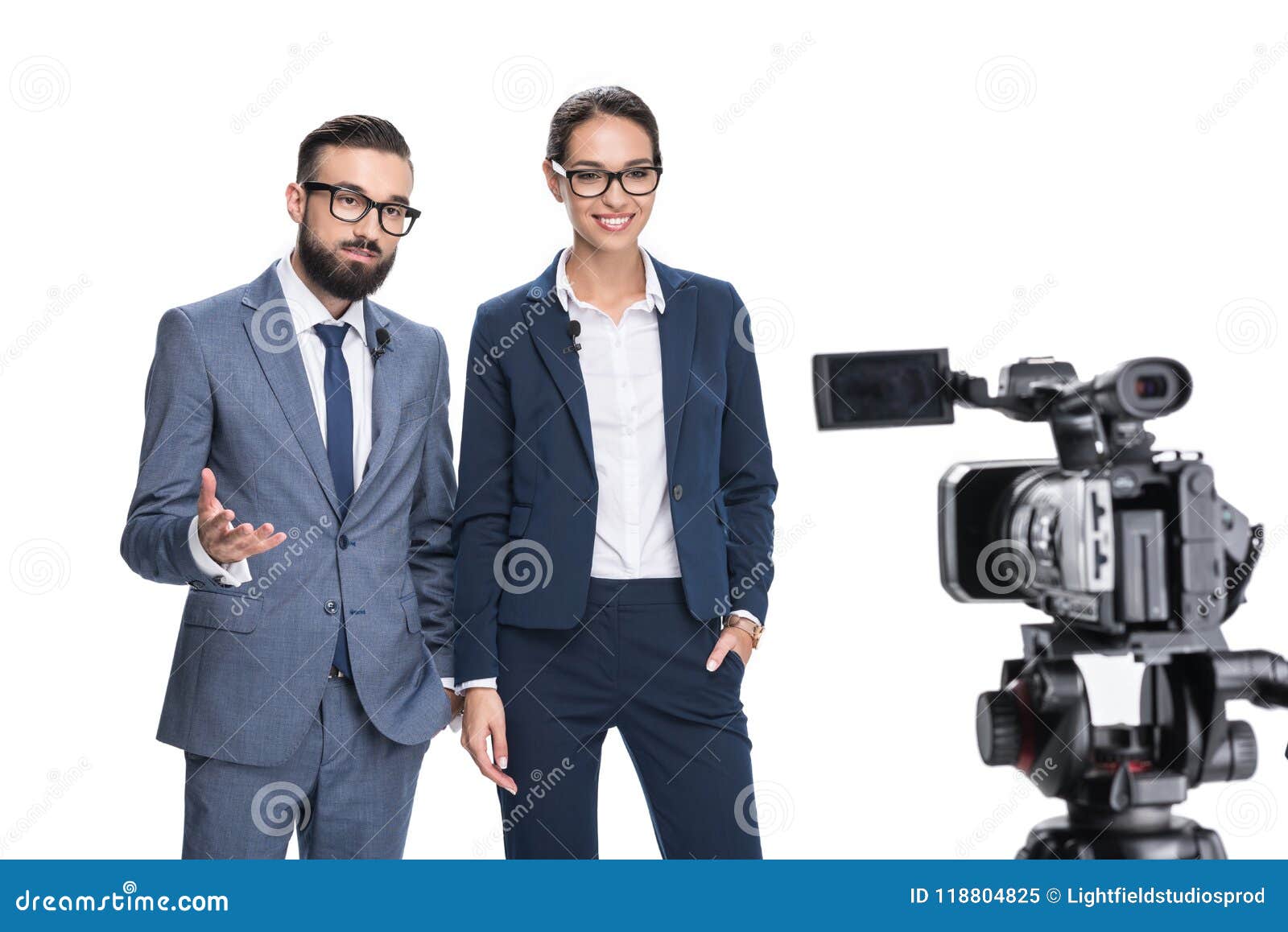 Selective Focus of Two Newscasters Taking and Looking at Camera, Stock ...