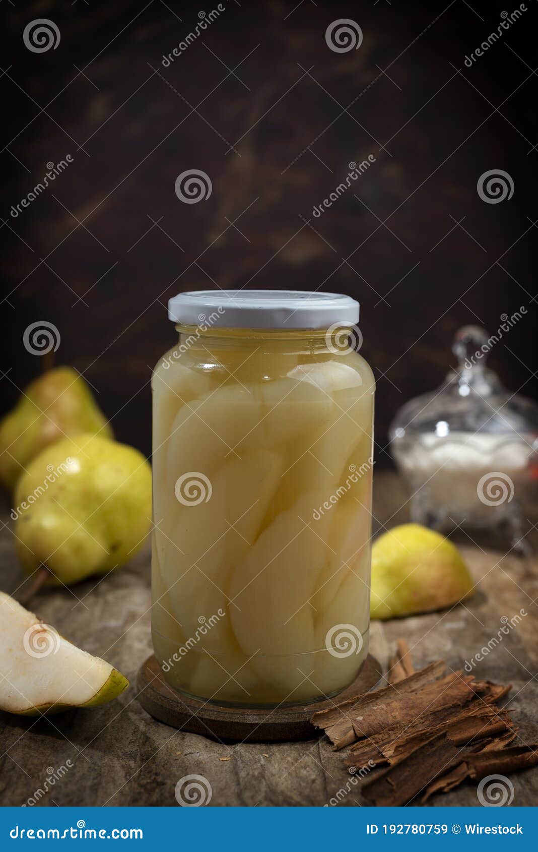 Selective Focus Vertical Shot of Pickled Pears Inside a Glass Jar with ...