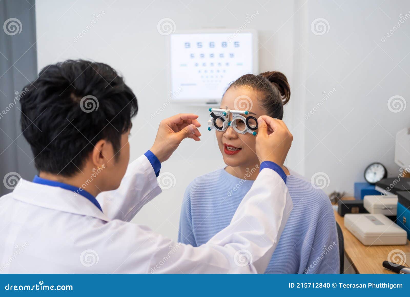 Selective Focus at Women Face. while Doctor Using Optometry Equipment ...