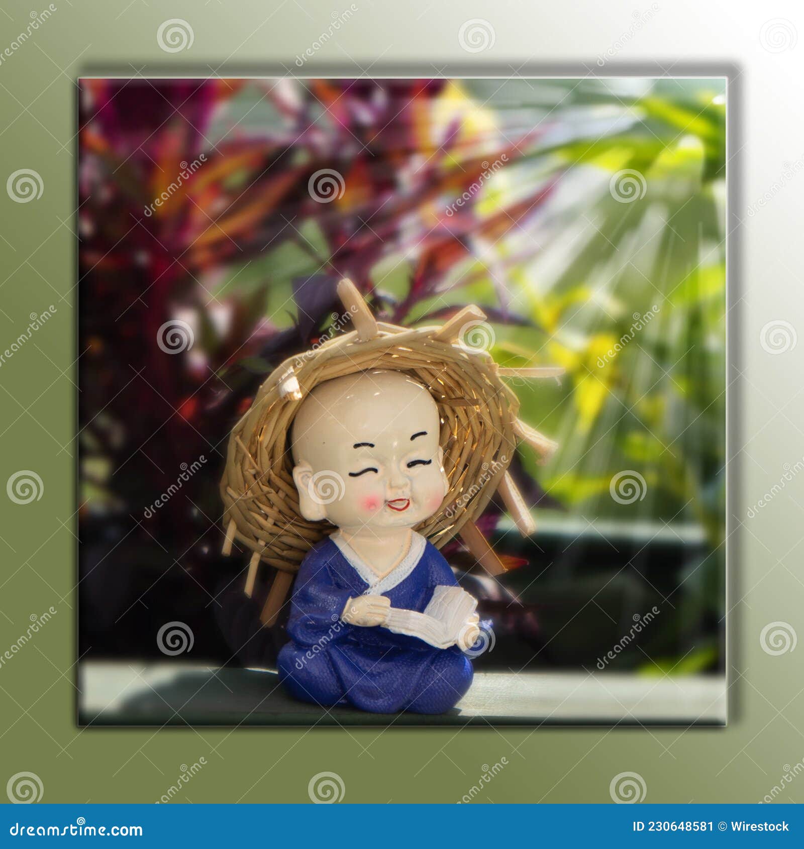 Selective of a Monk Doll in Straw Hat Under the Sun Rays Stock Image ...