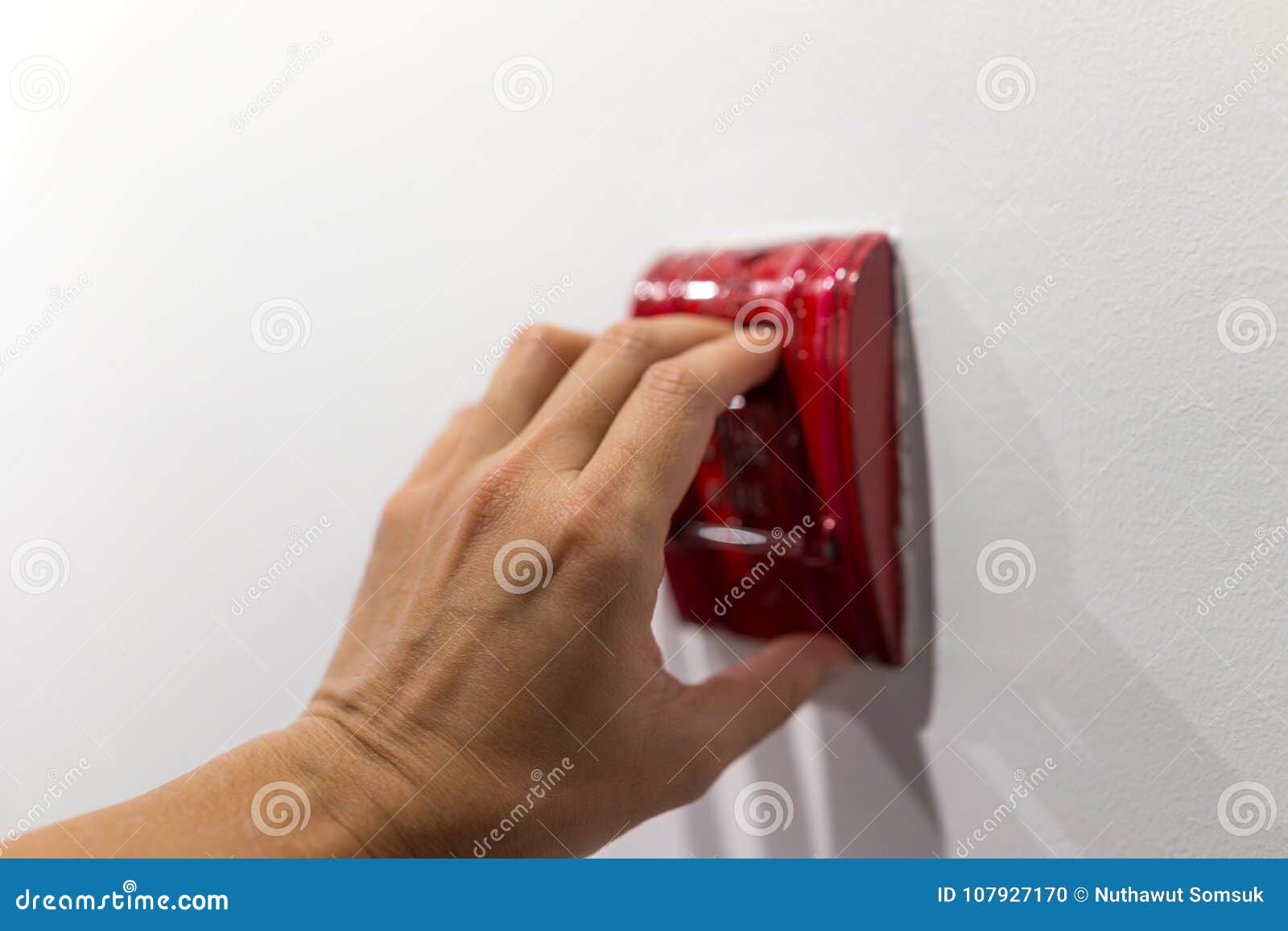Selectived Focus on Hand Pulling Fire Alarm on White Wall To Act Stock ...