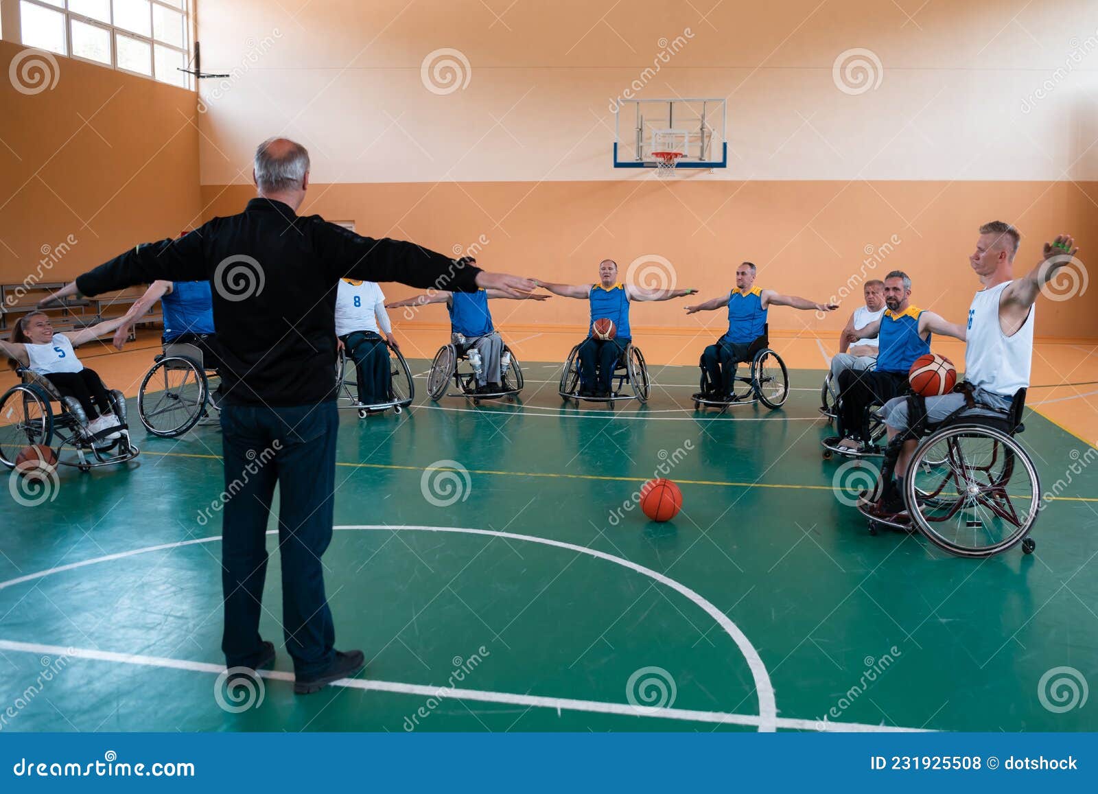The Selector of the Basketball Team with a Disability Stands in Front ...