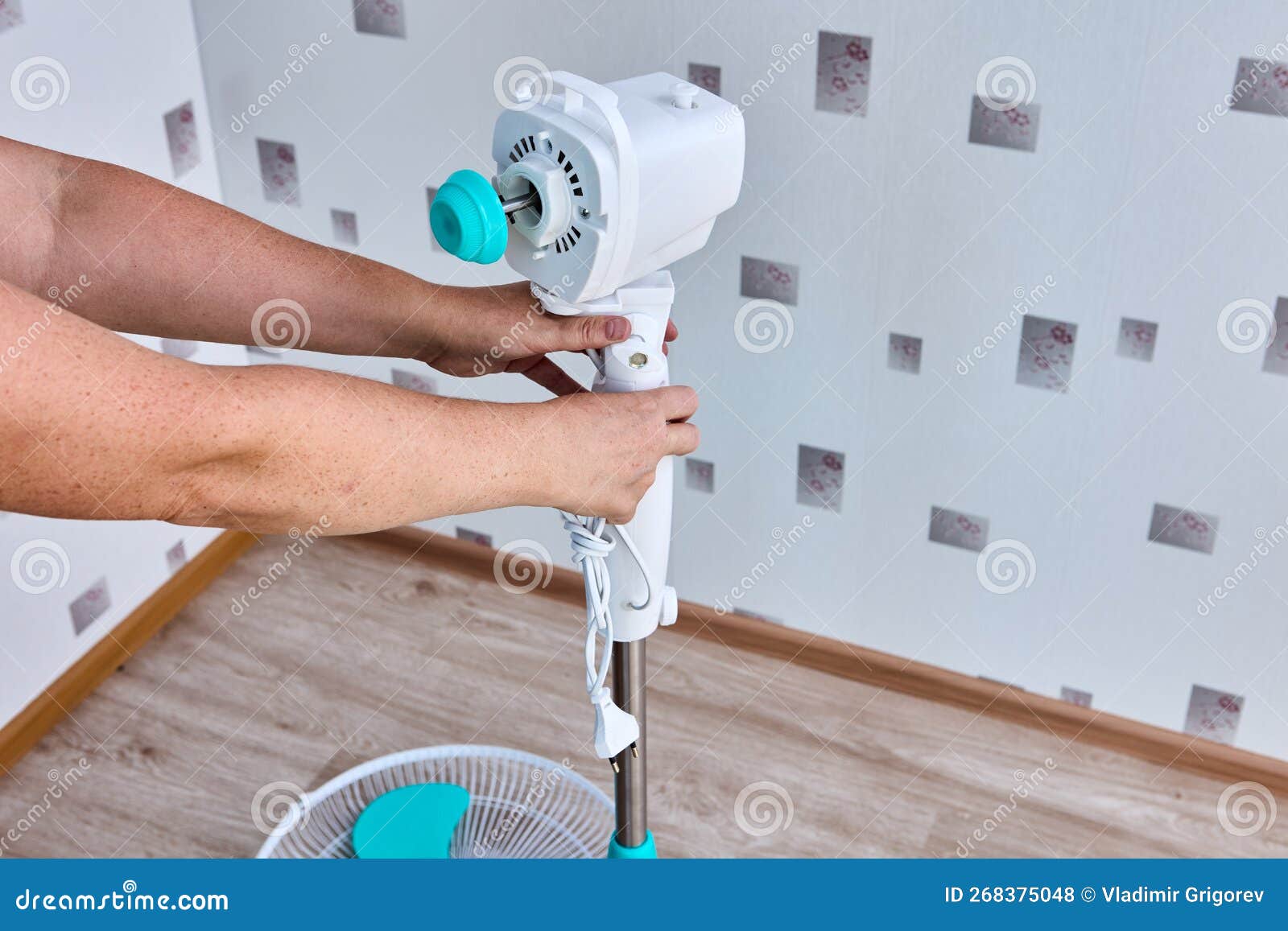 DIY Assembly of Floor Fan from Factory Packaging. Stock Photo - Image ...