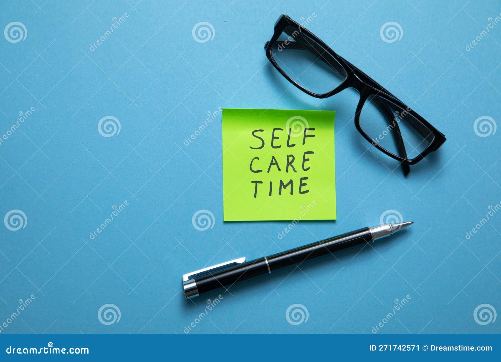 Self Care Time on Sticky Note with a Clock and Business Objects Stock ...