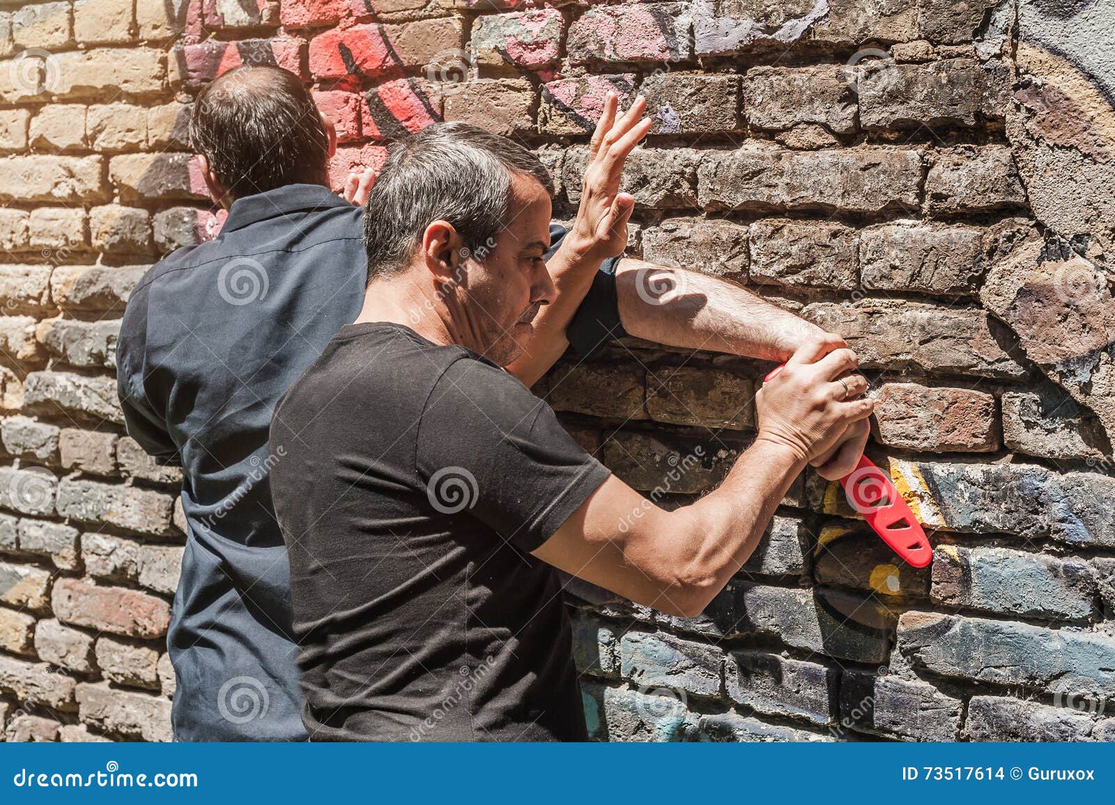 Self Defense Techniques Against a Knife Attack Stock Photo - Image of ...